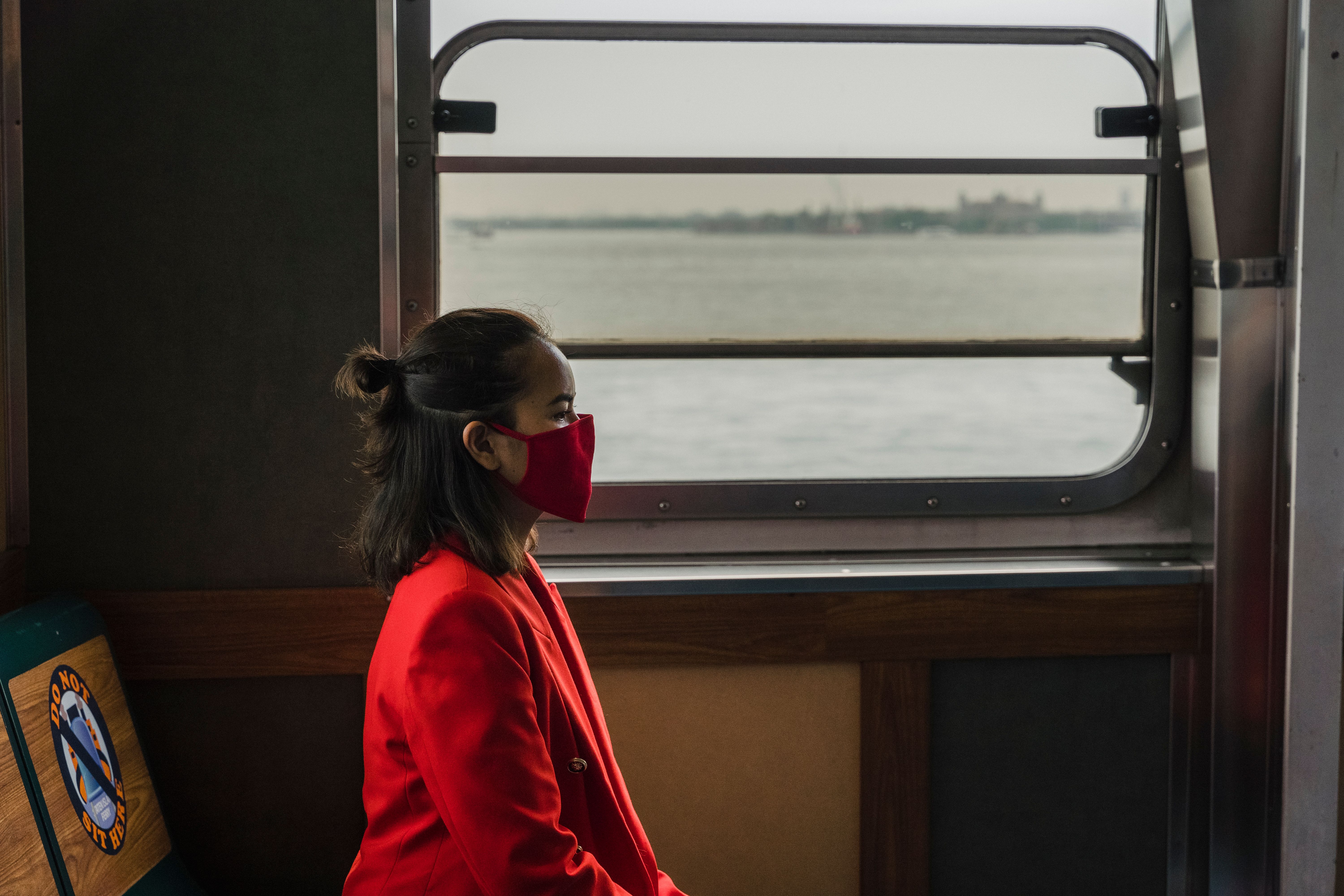 Woman Wearing a Red Face Mask and Red Suit · Free Stock Photo