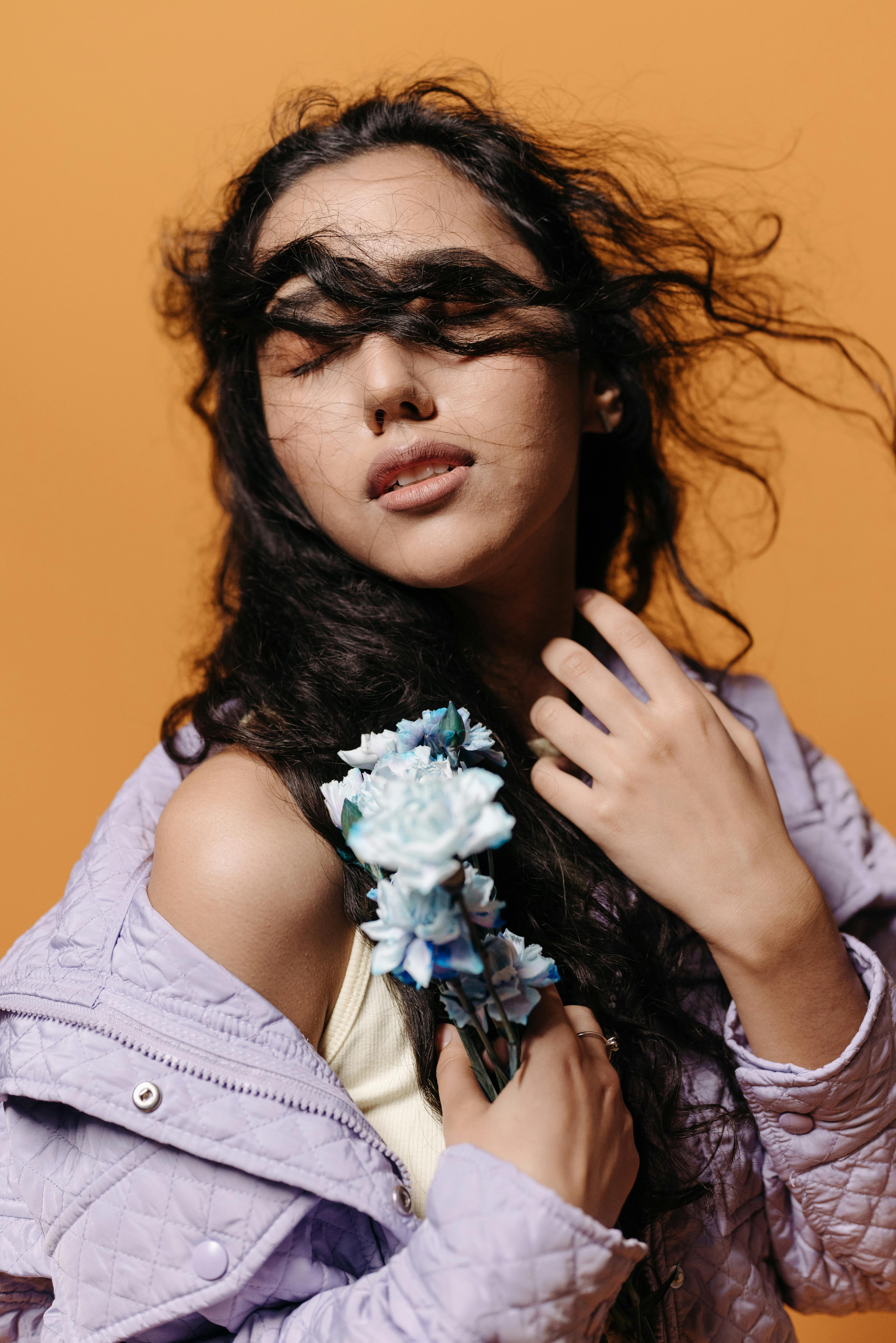 Portrait of Model in Dress Against Black Backdrop · Free Stock Photo