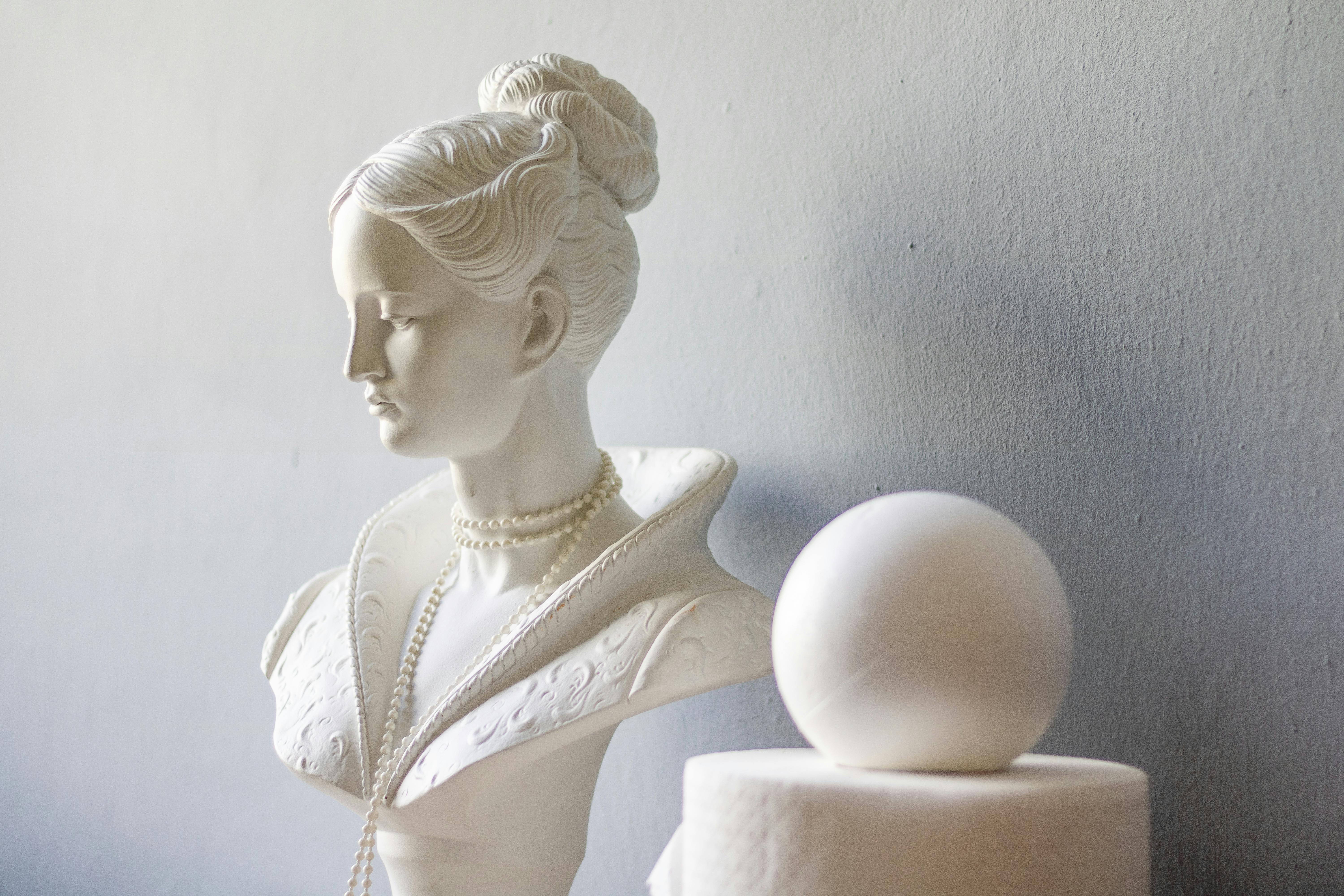 Bust of a Woman Wearing Pearls · Free Stock Photo