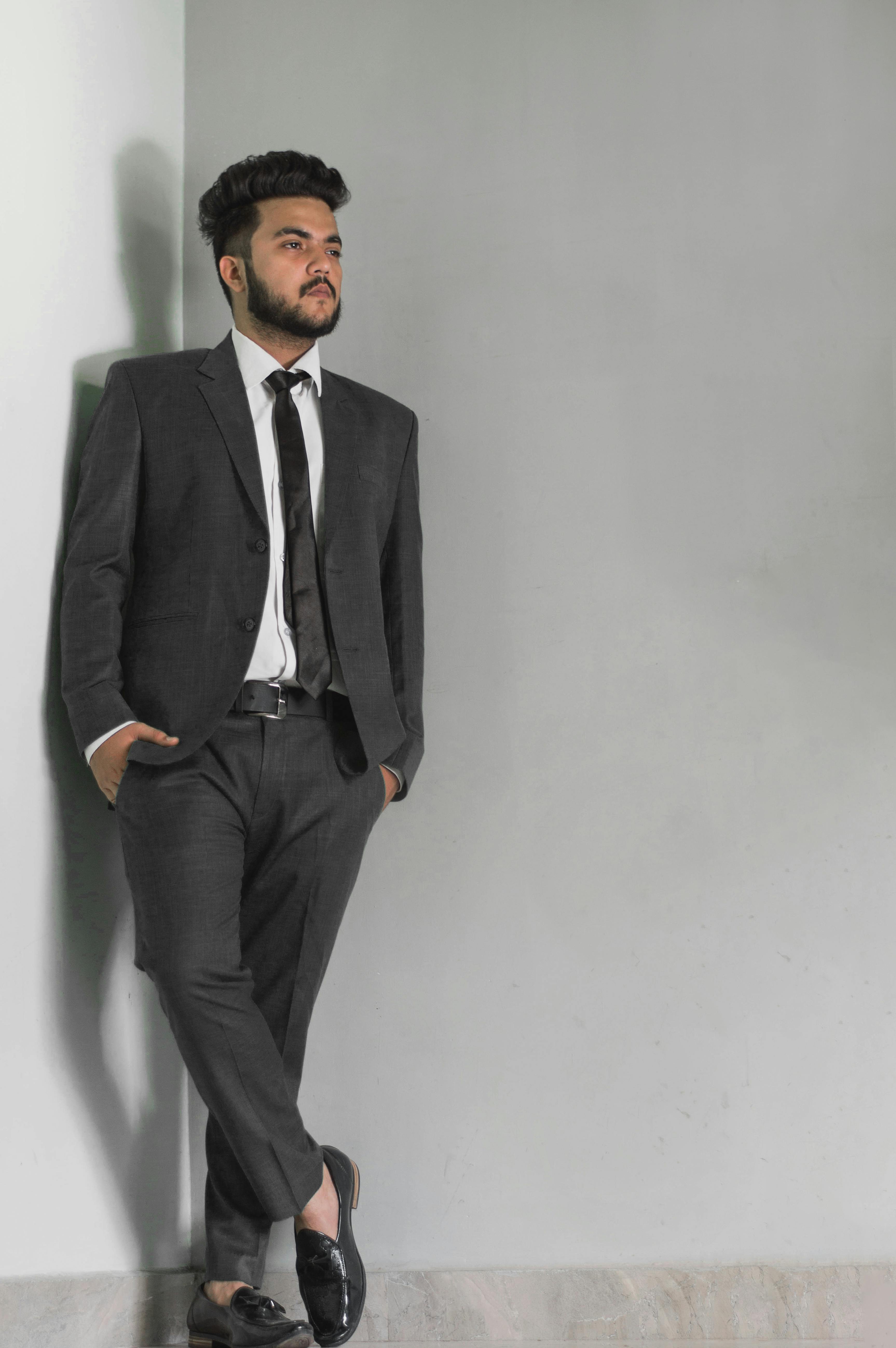 Man Posing in a Suit in a Studio Shoot · Free Stock Photo