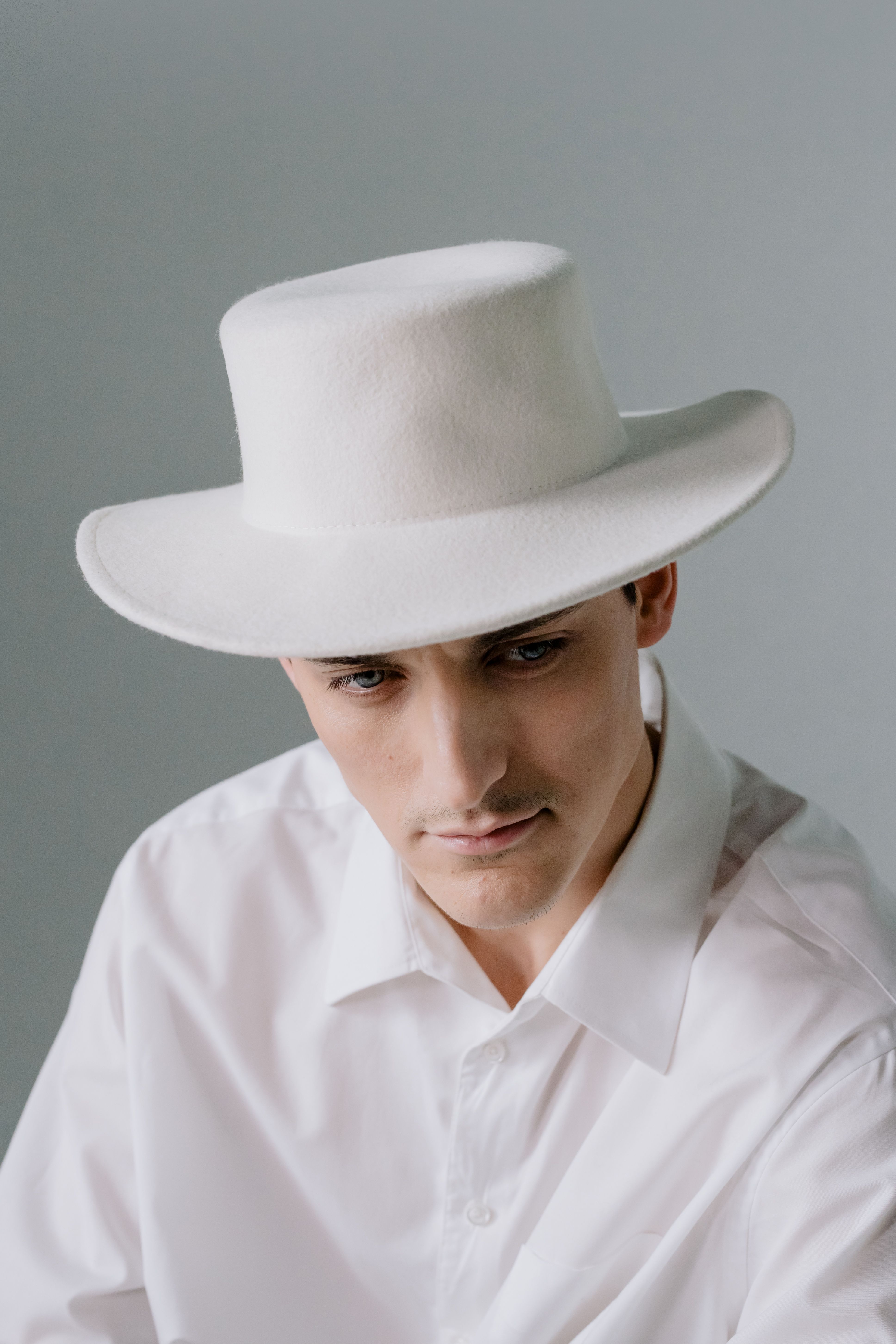 Man in Black Hat Smiling · Free Stock Photo