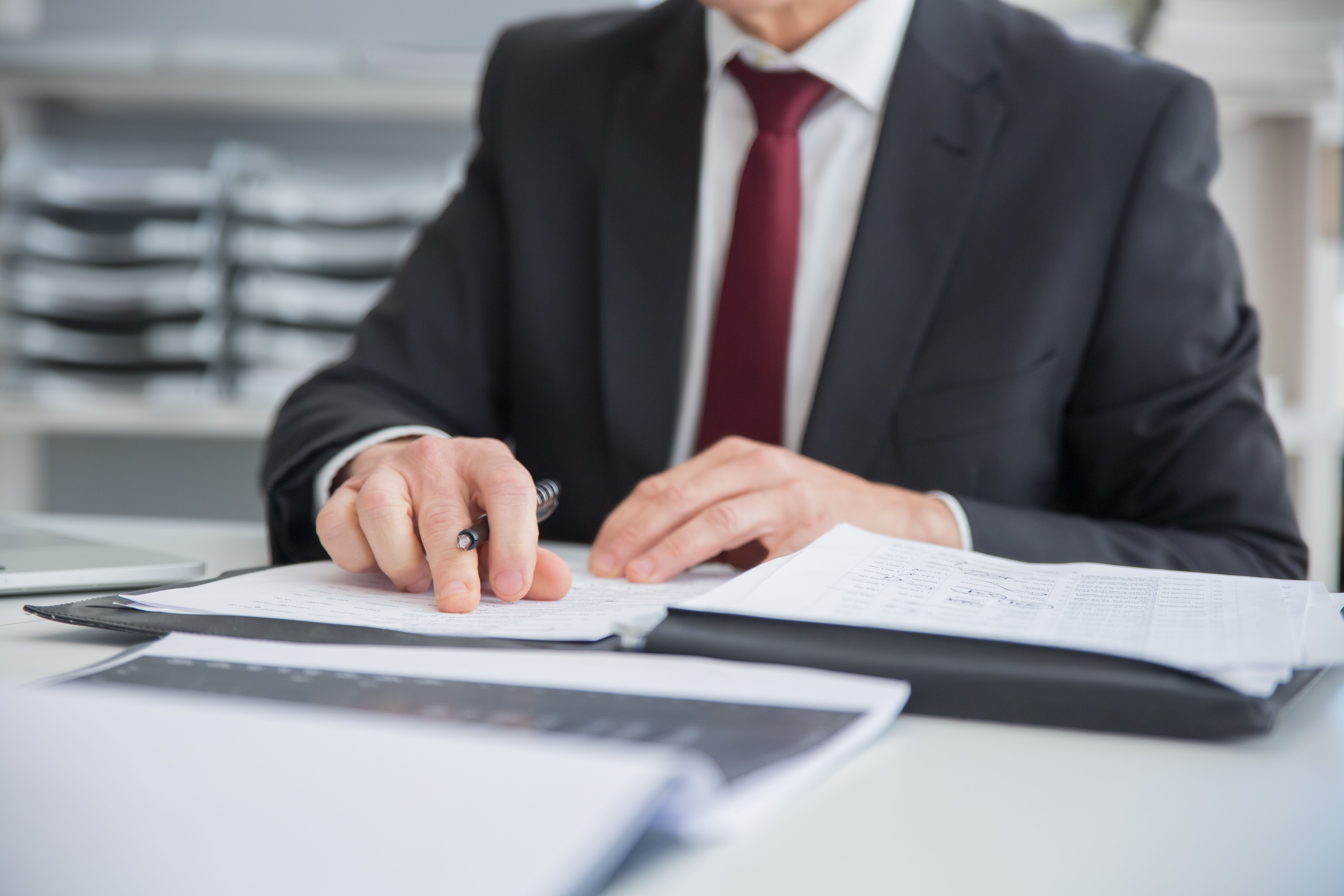 A Man Holding Documents · Free Stock Photo