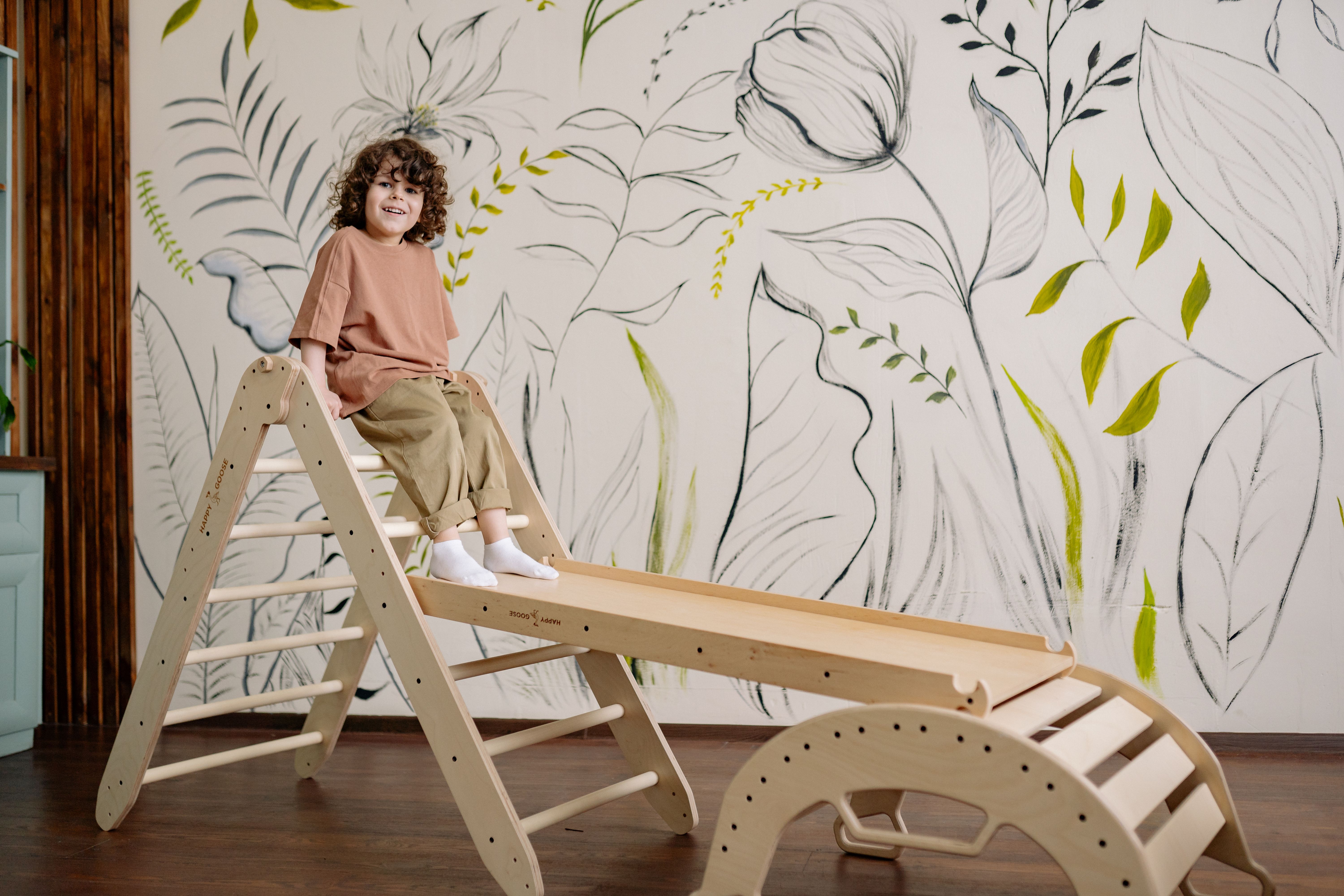 Little Girl Playing on a Wooden Toy Ladder · Free Stock Photo