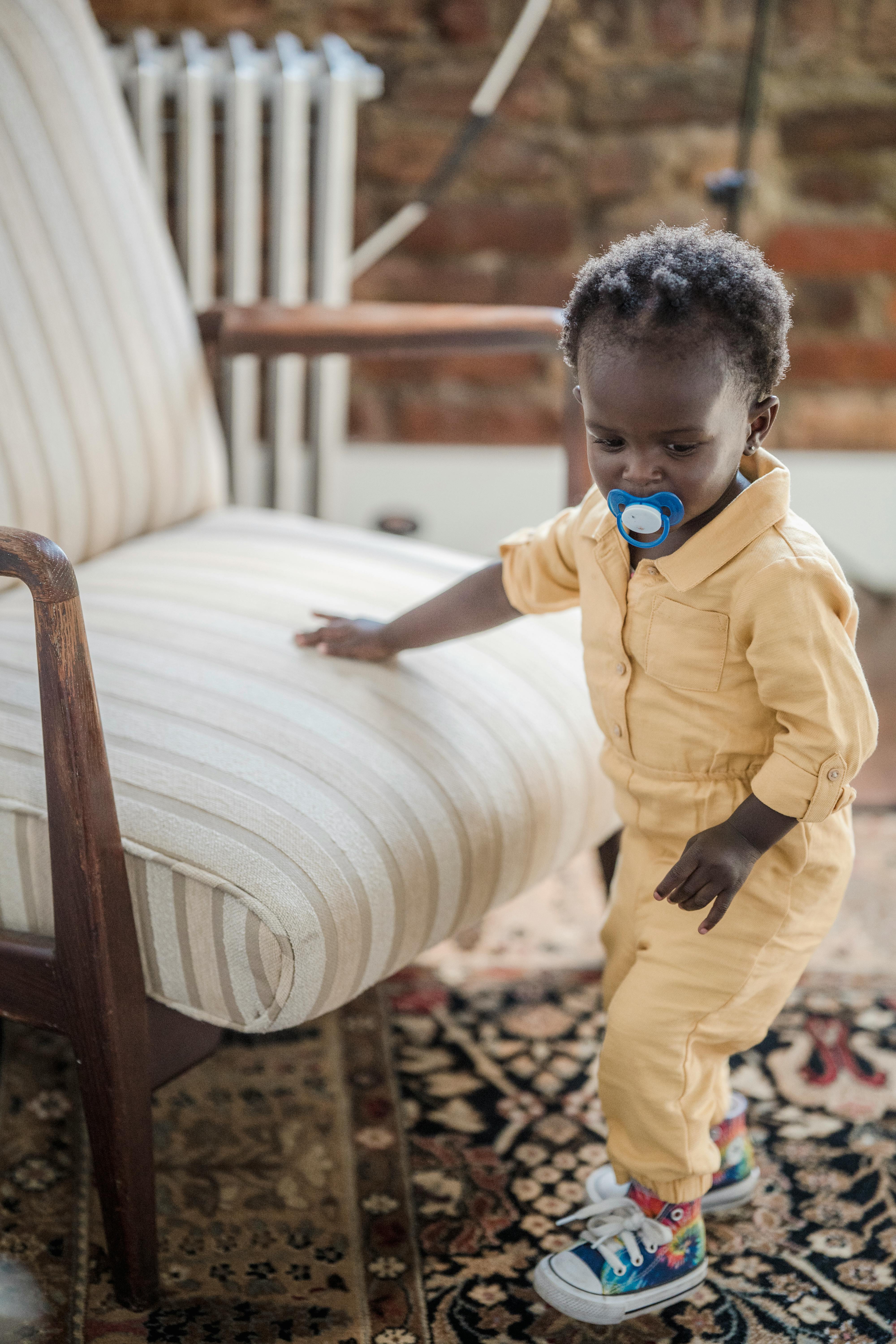 Boy with Babys Pacifier · Free Stock Photo