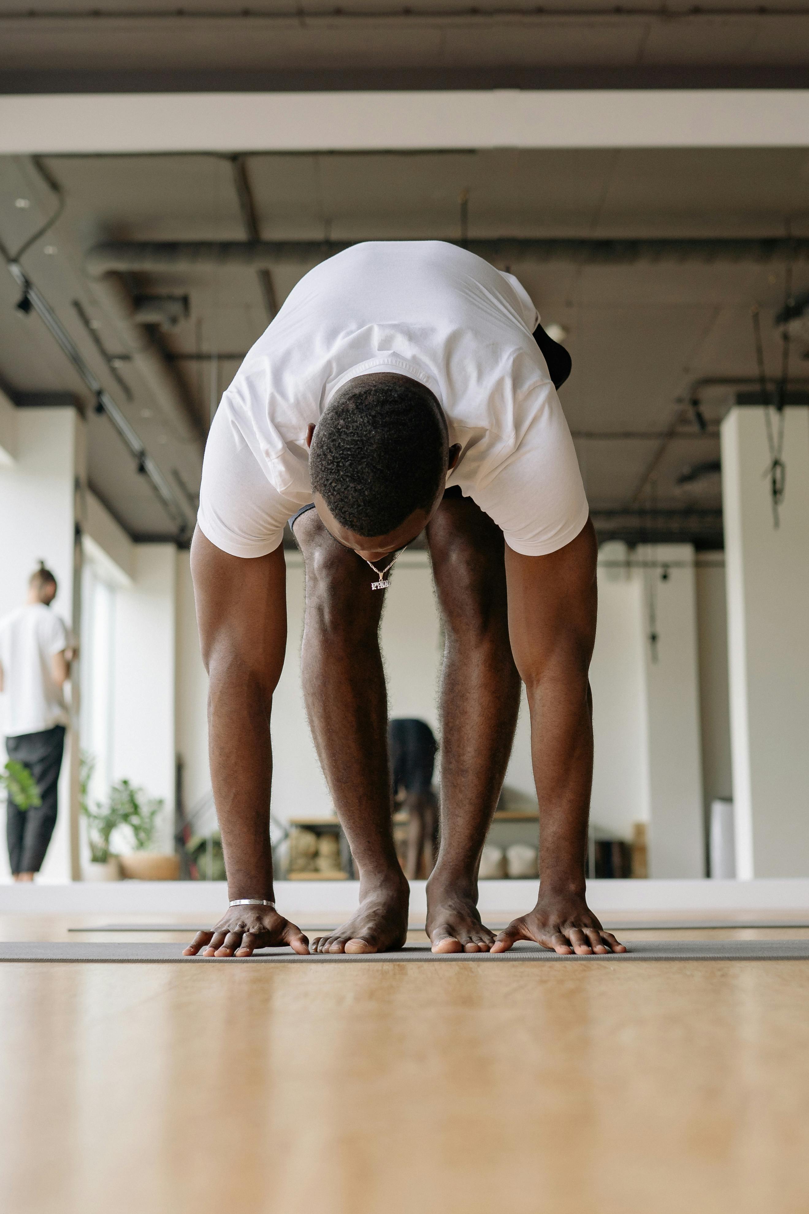A Yoga Instructor Teaching Proper Body Position · Free Stock Photo