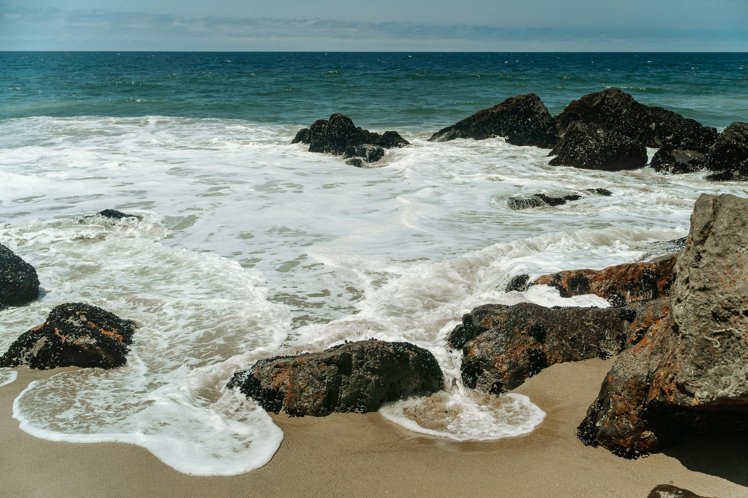 A Rock on a Beach · Free Stock Photo