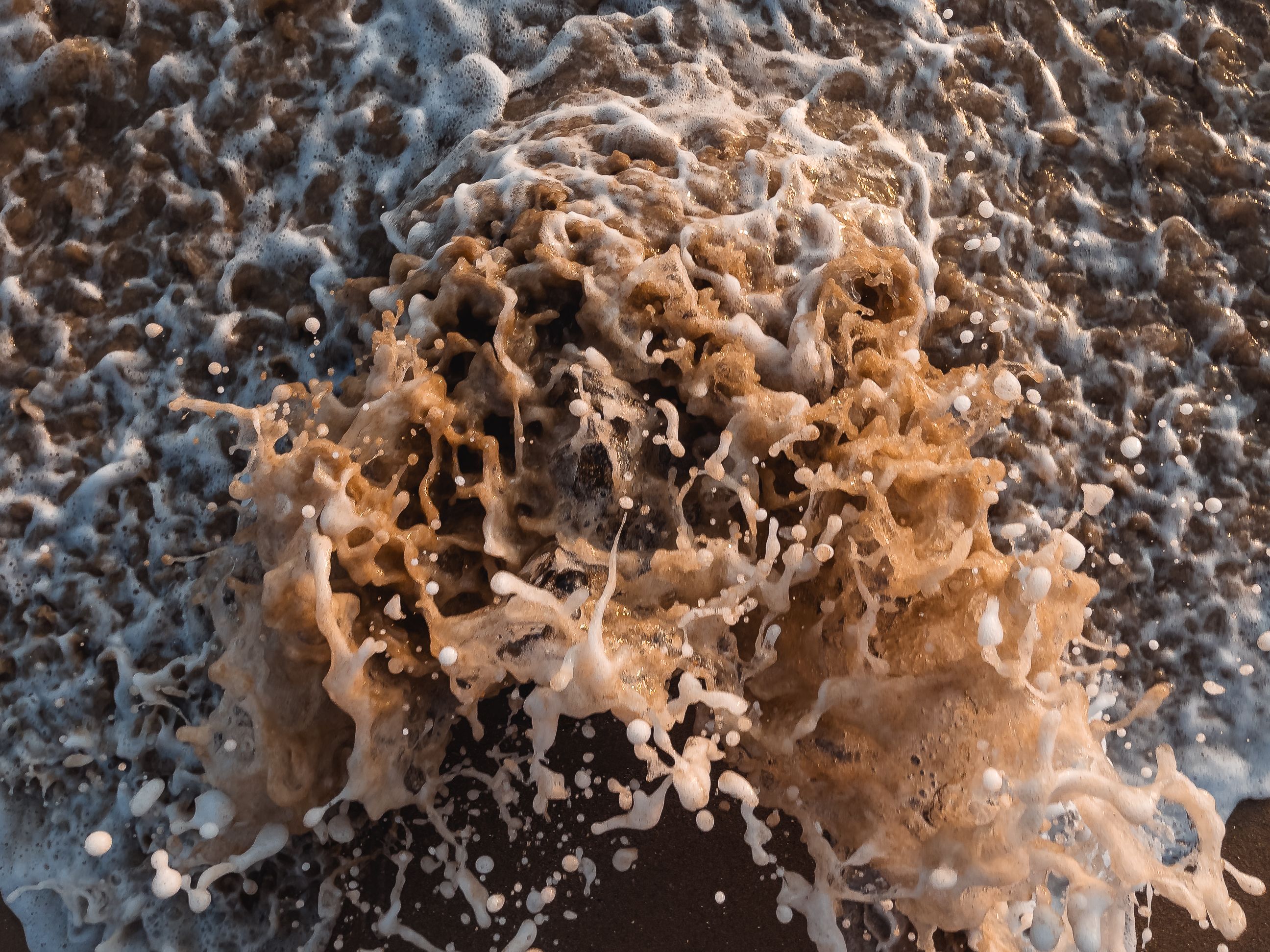 Sea Water Mixed with Sand · Free Stock Photo