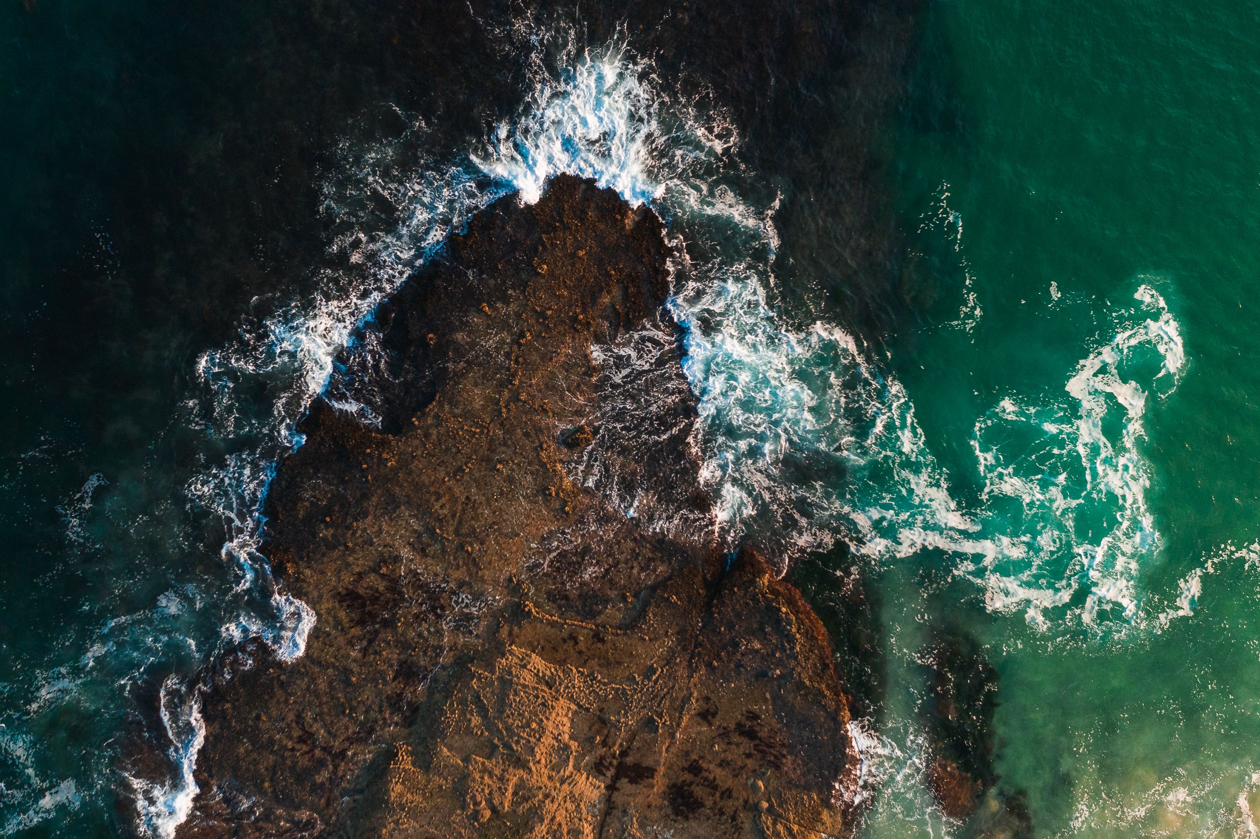 Waves Crashing on Rock Formation · Free Stock Photo