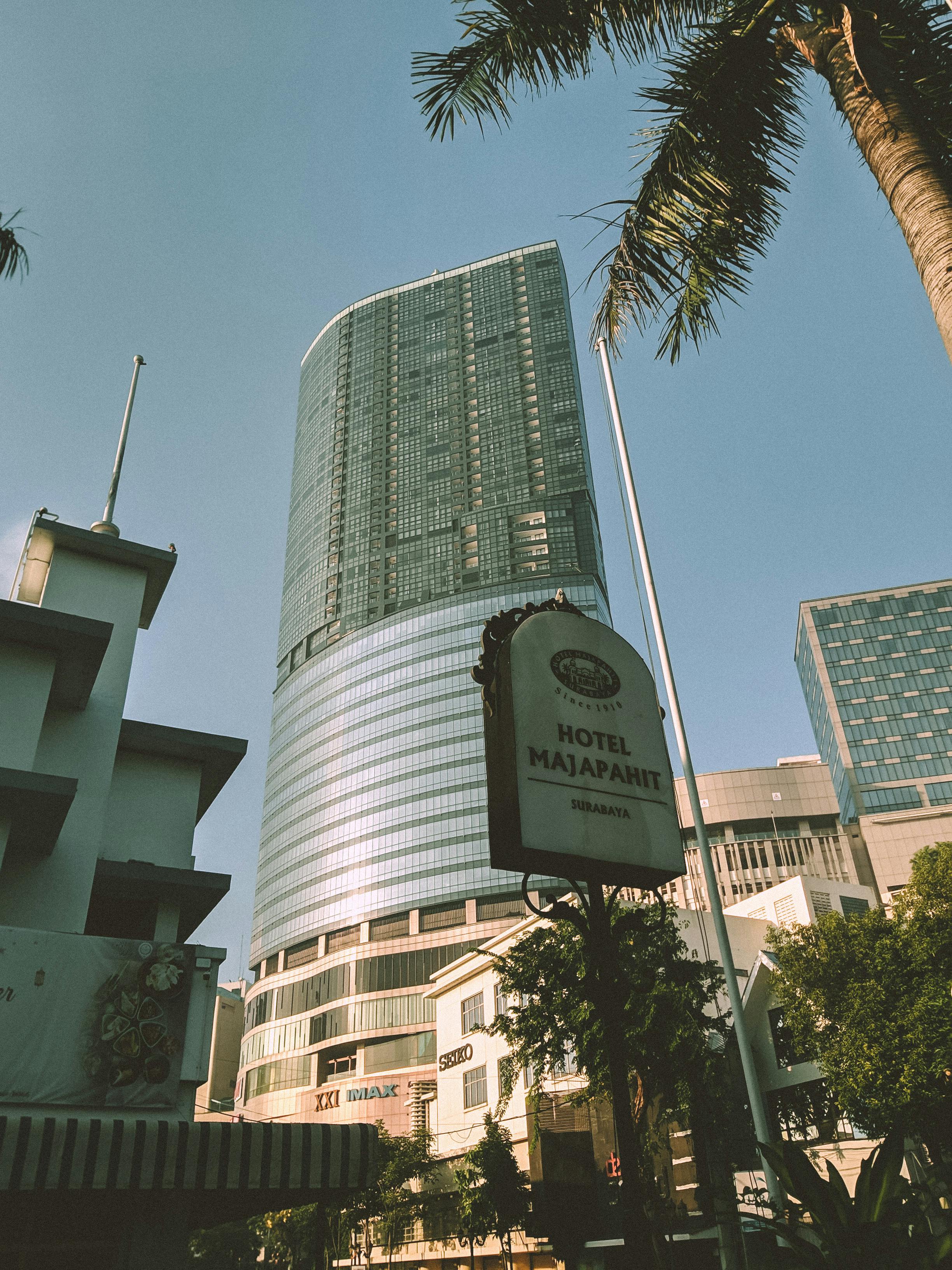 Polaroid Picture of the Starbucks Sign on a Pole · Free Stock Photo