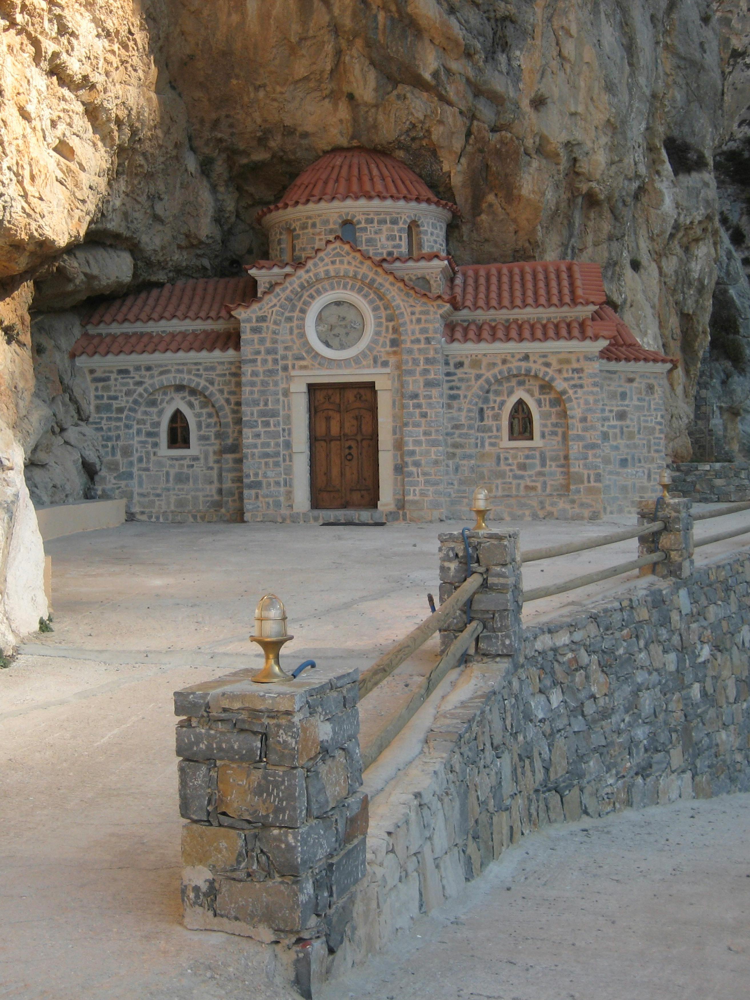 Stone Church Built Beneath a Rock · Free Stock Photo