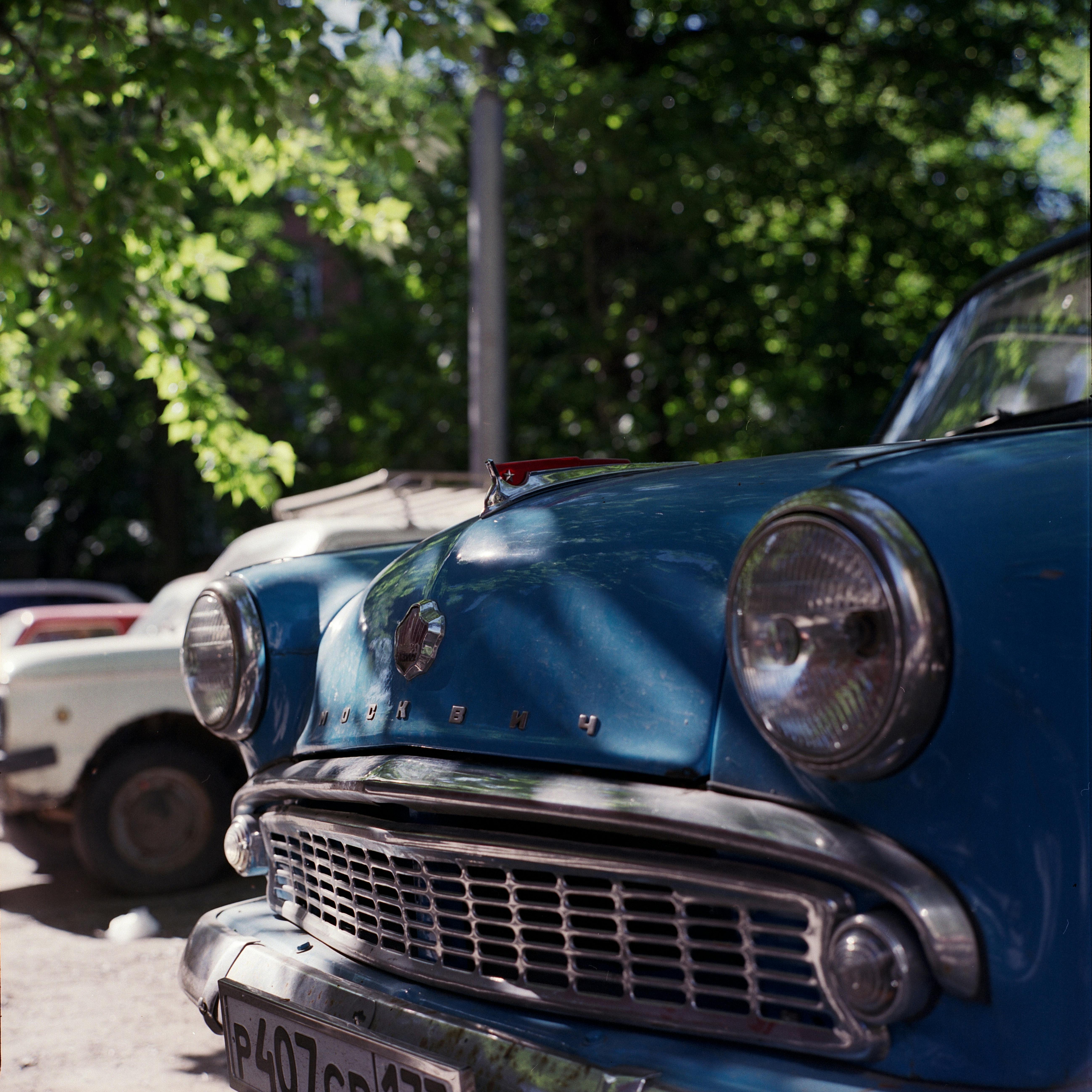 Close-Up Shot of Blue Car · Free Stock Photo