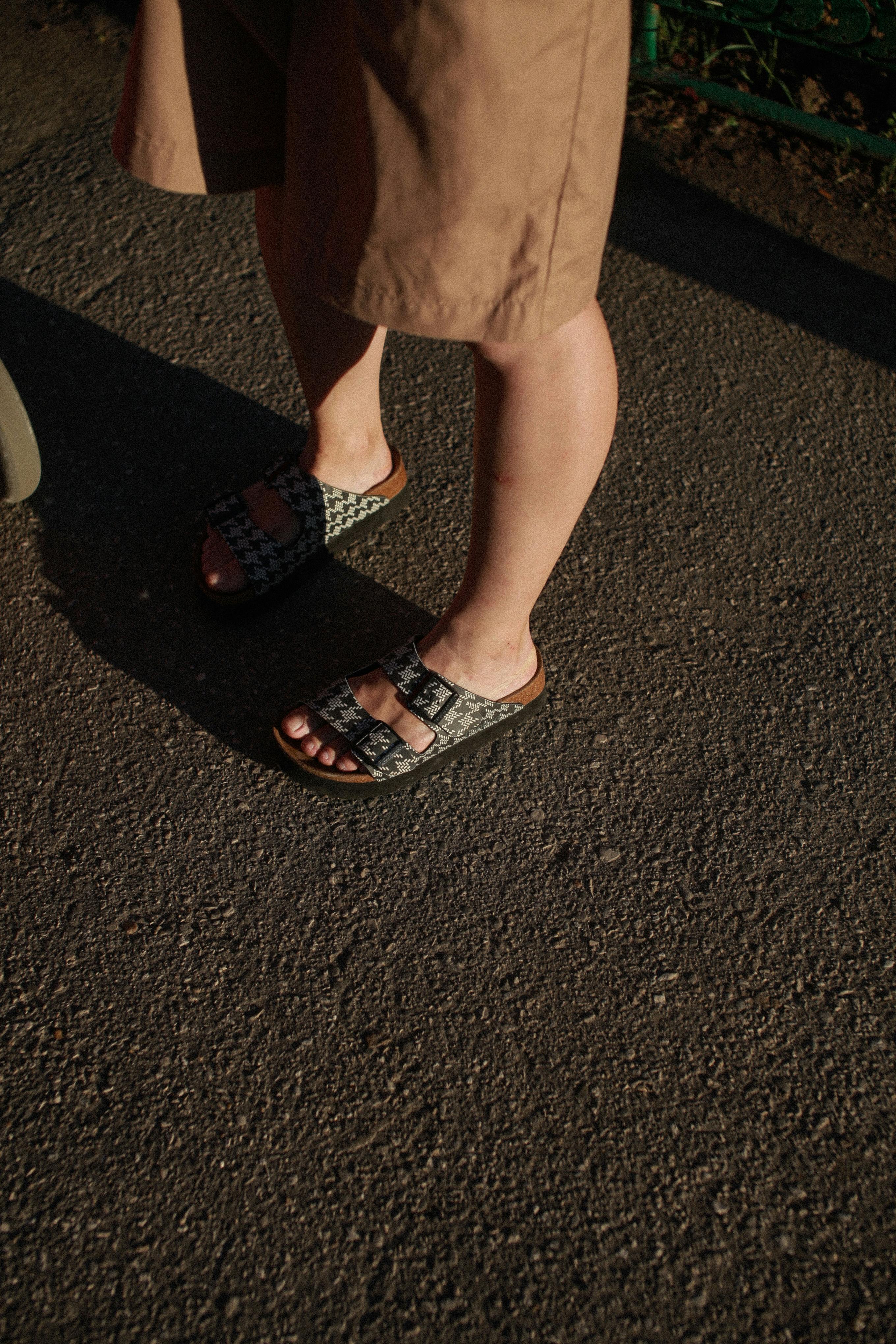A Person Wearing Sandals · Free Stock Photo
