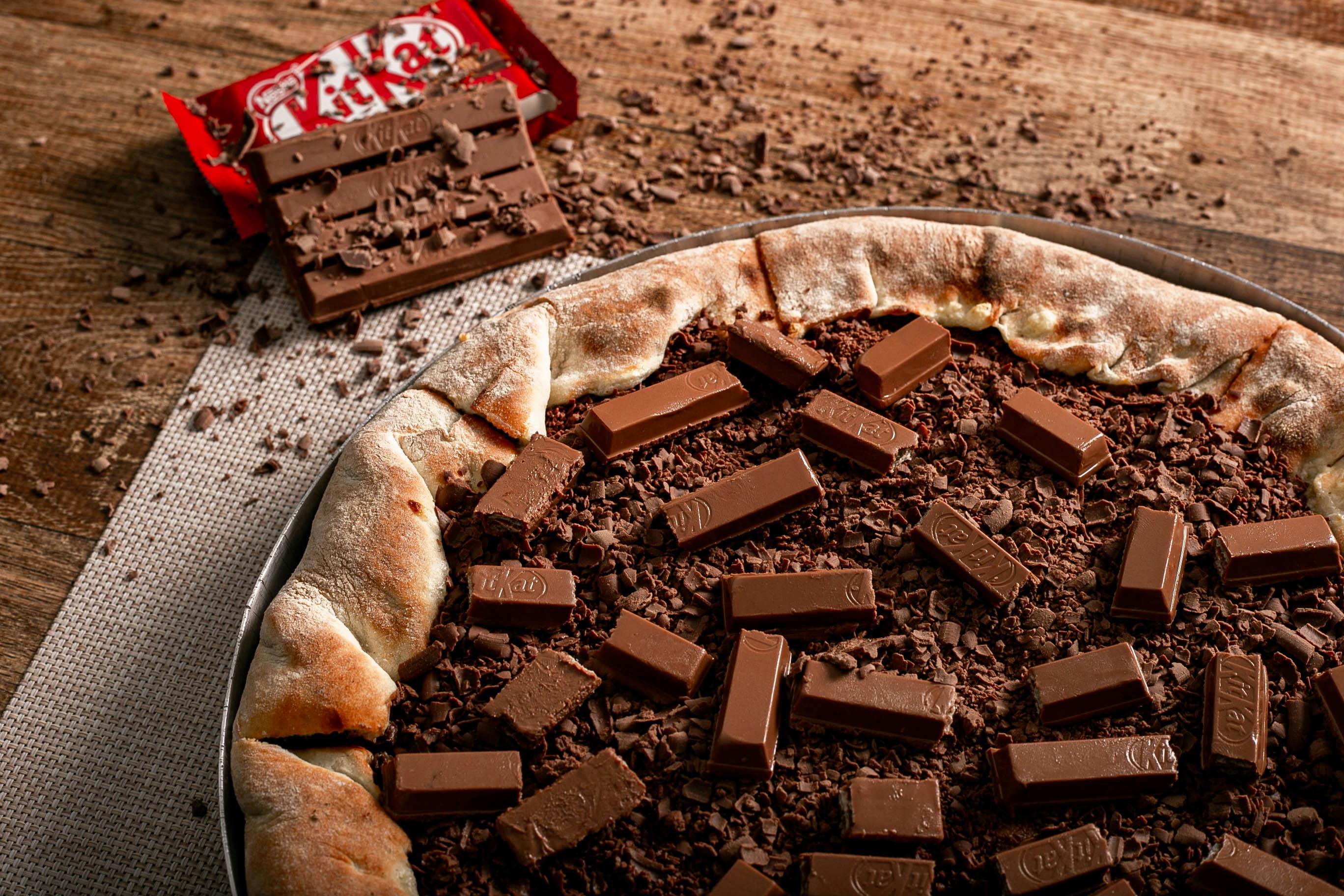 KitKat Chocolate Bars on Pizza · Free Stock Photo