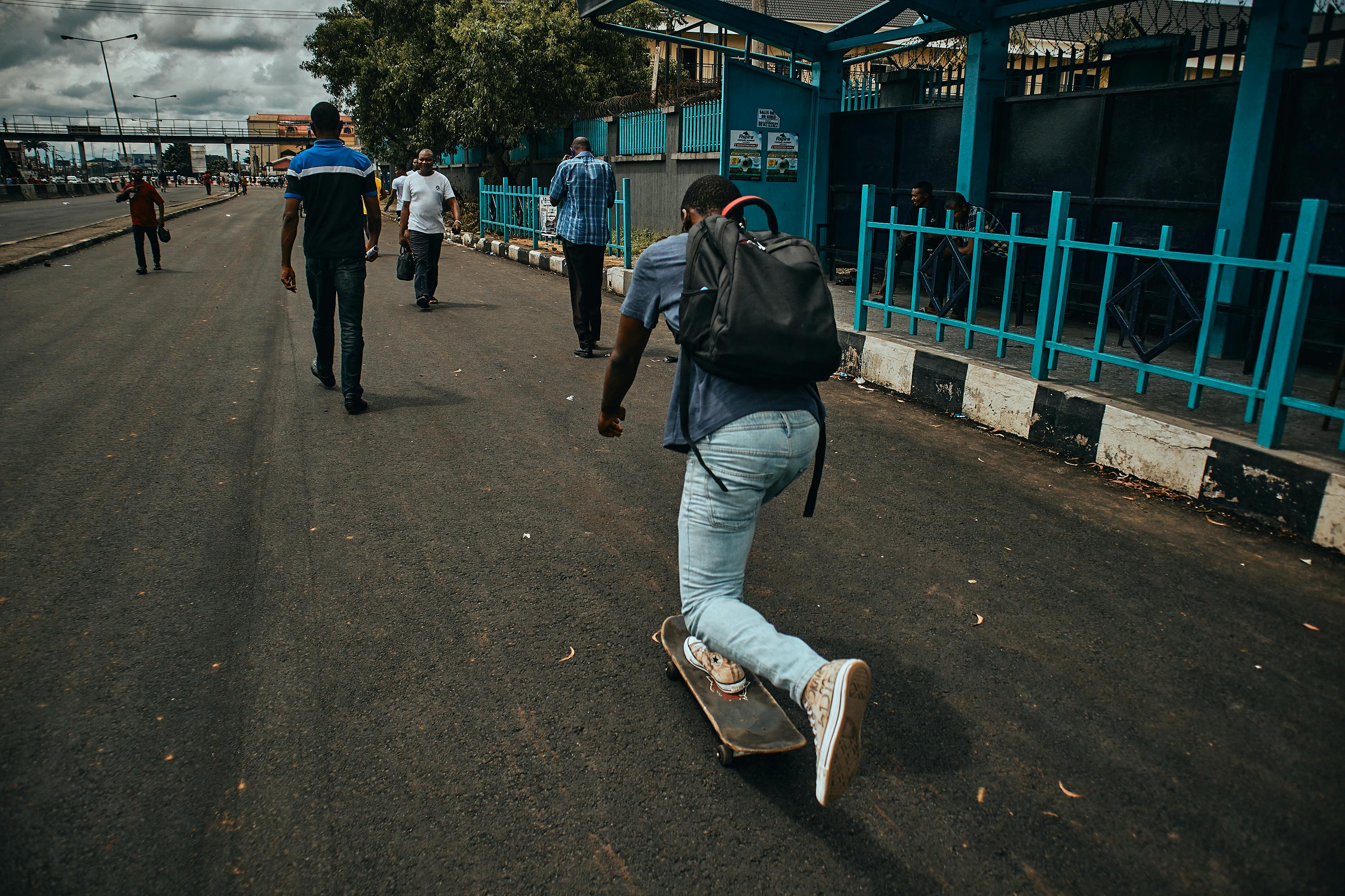 Grayscale Photography of Man Riding Skateboard Making Tricks Near ...