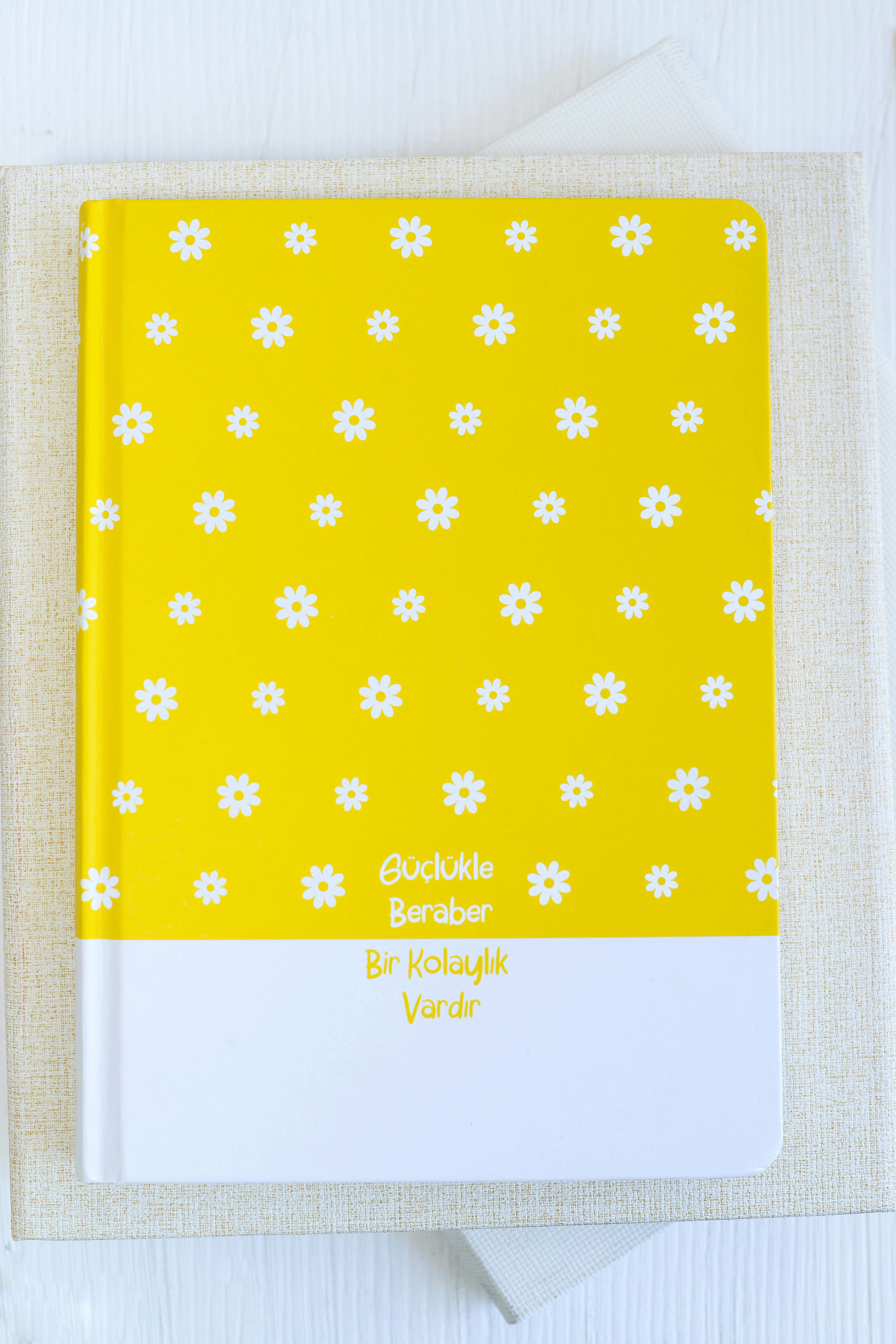 Close-up Photo of Yellow Floral Notebook · Free Stock Photo