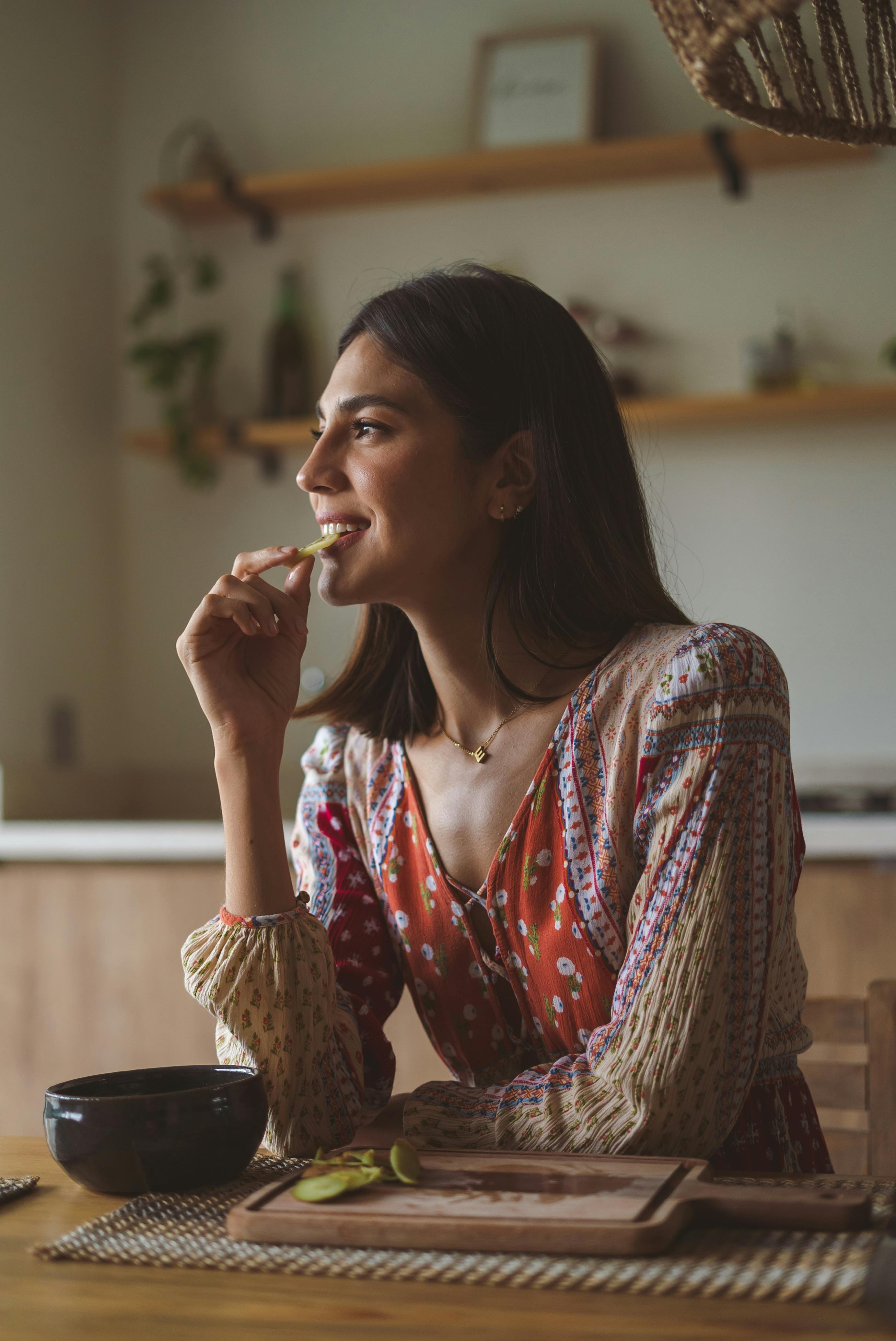 Close-Up Shot of a Woman Eating · Free Stock Photo