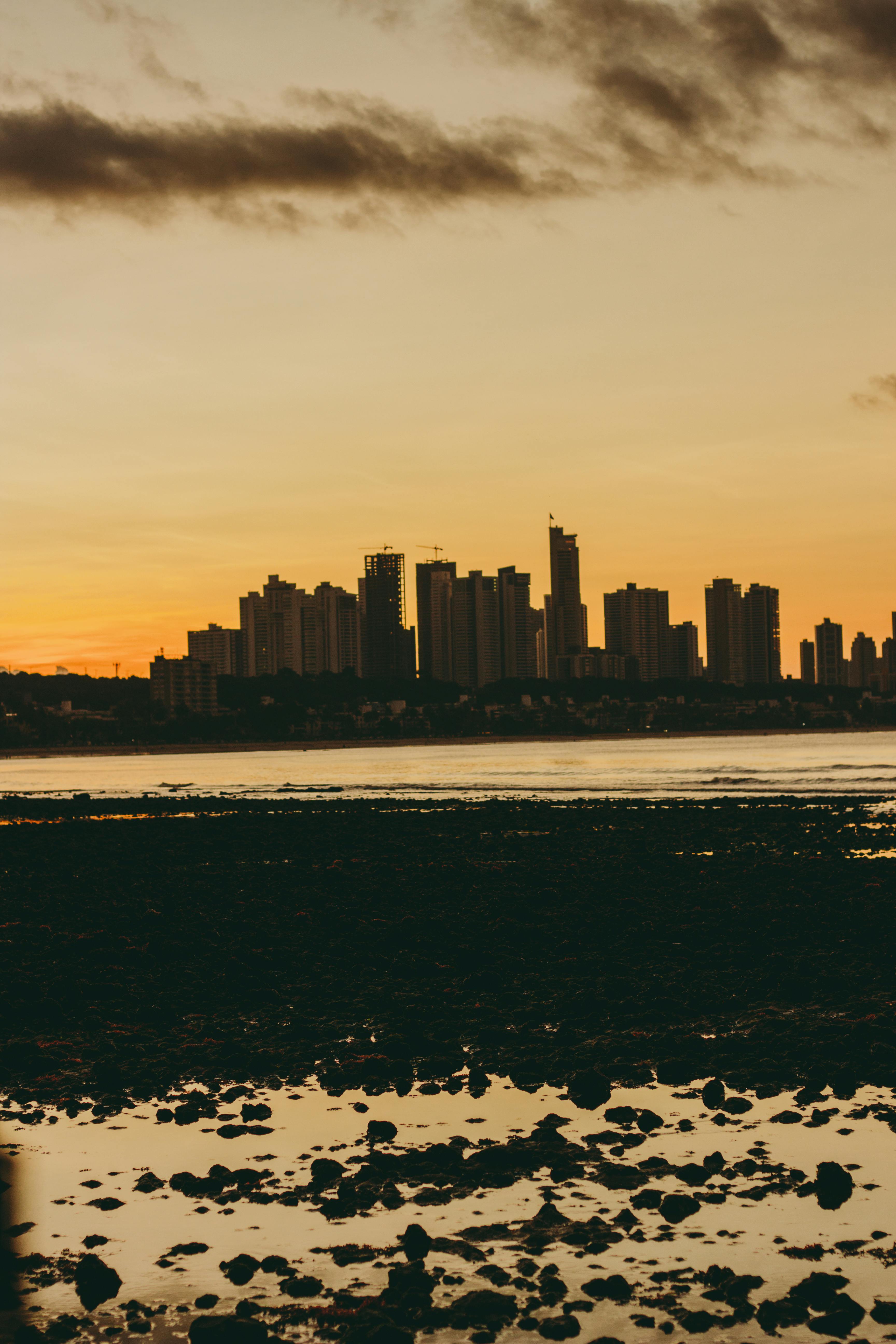 Silhouette of a High-Rise Building during Sunset · Free Stock Photo