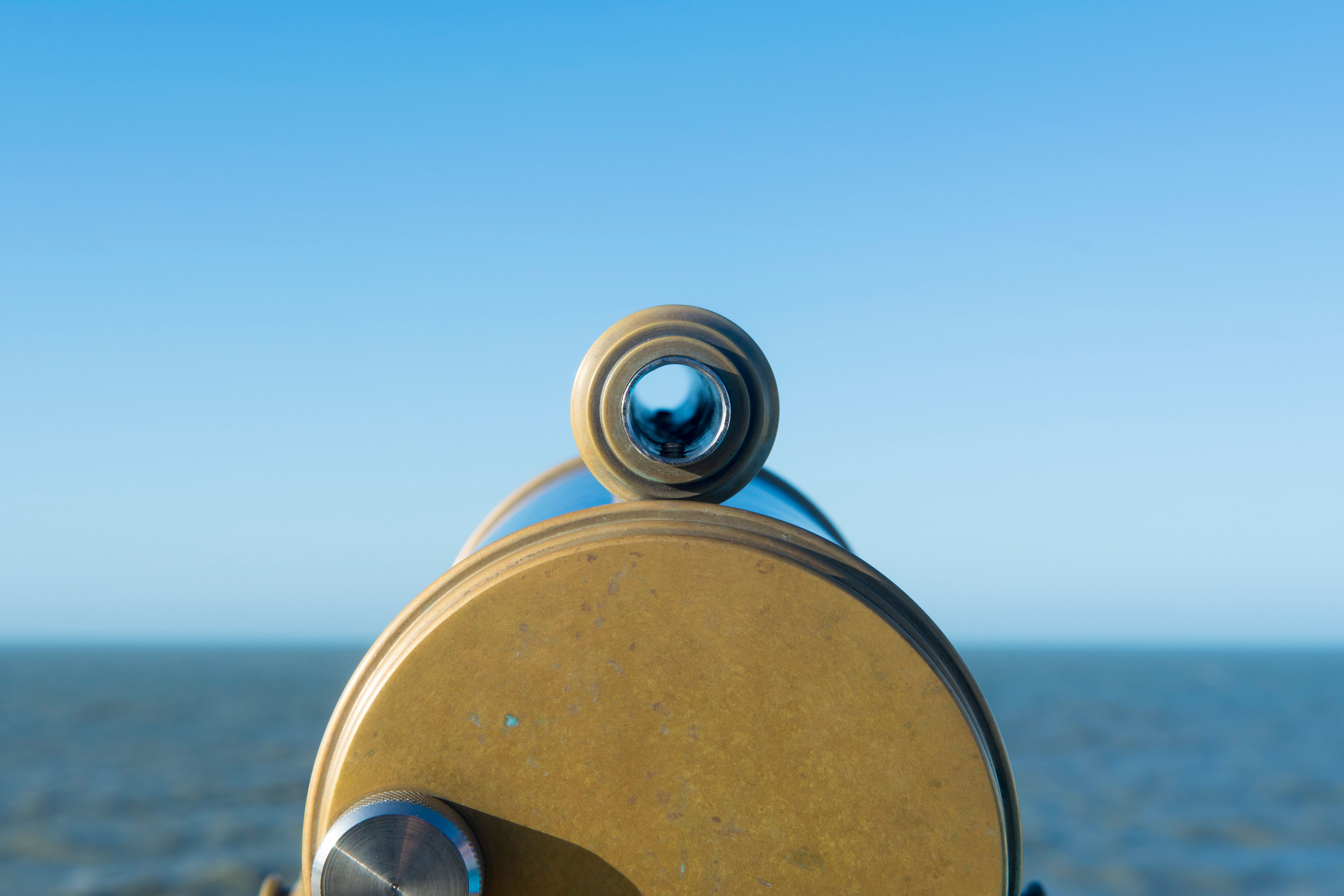 Close-Up Shot of a Silver and Gold Telescope · Free Stock Photo