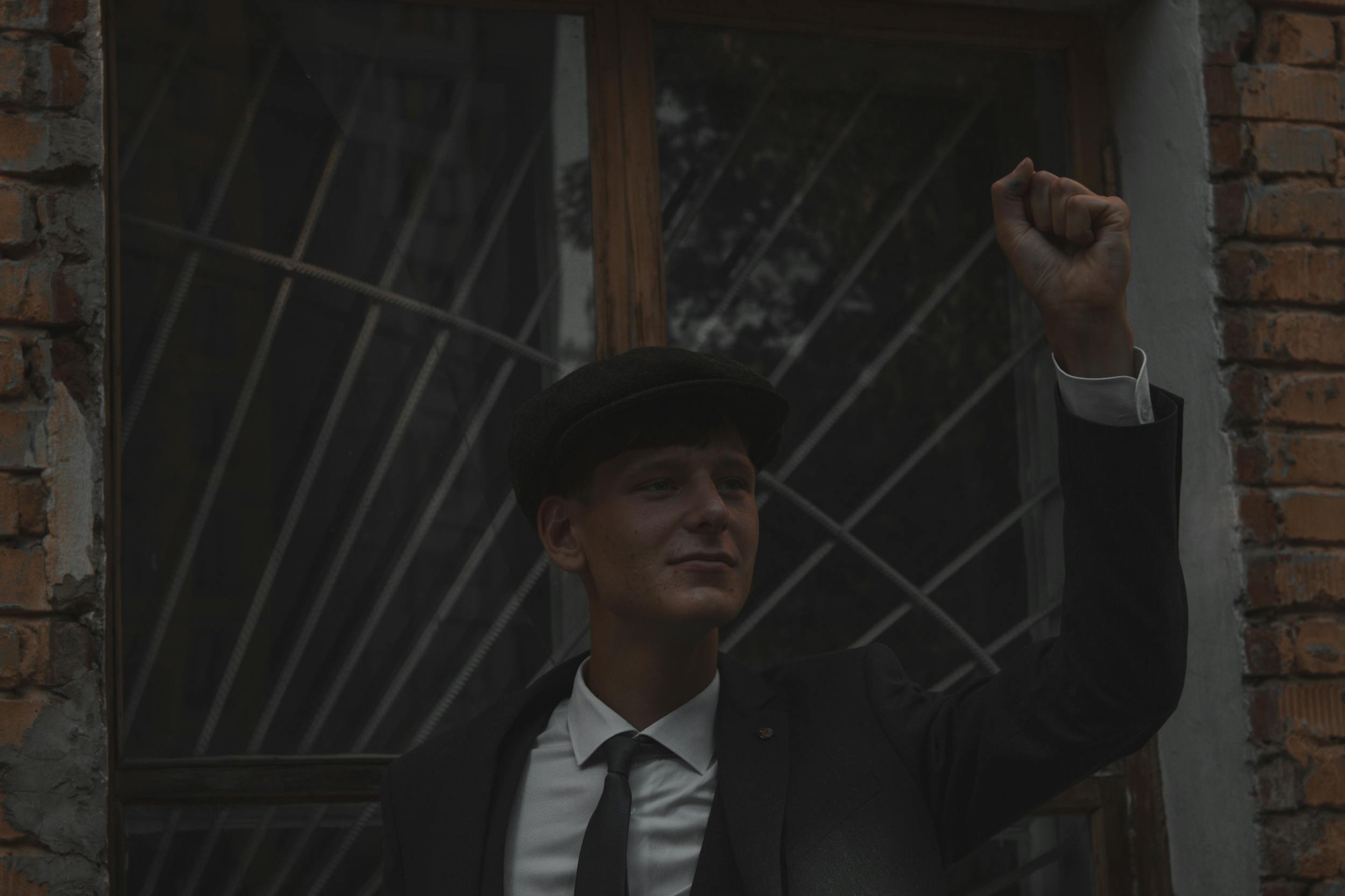 Photo Of Man With His Arm Raised · Free Stock Photo