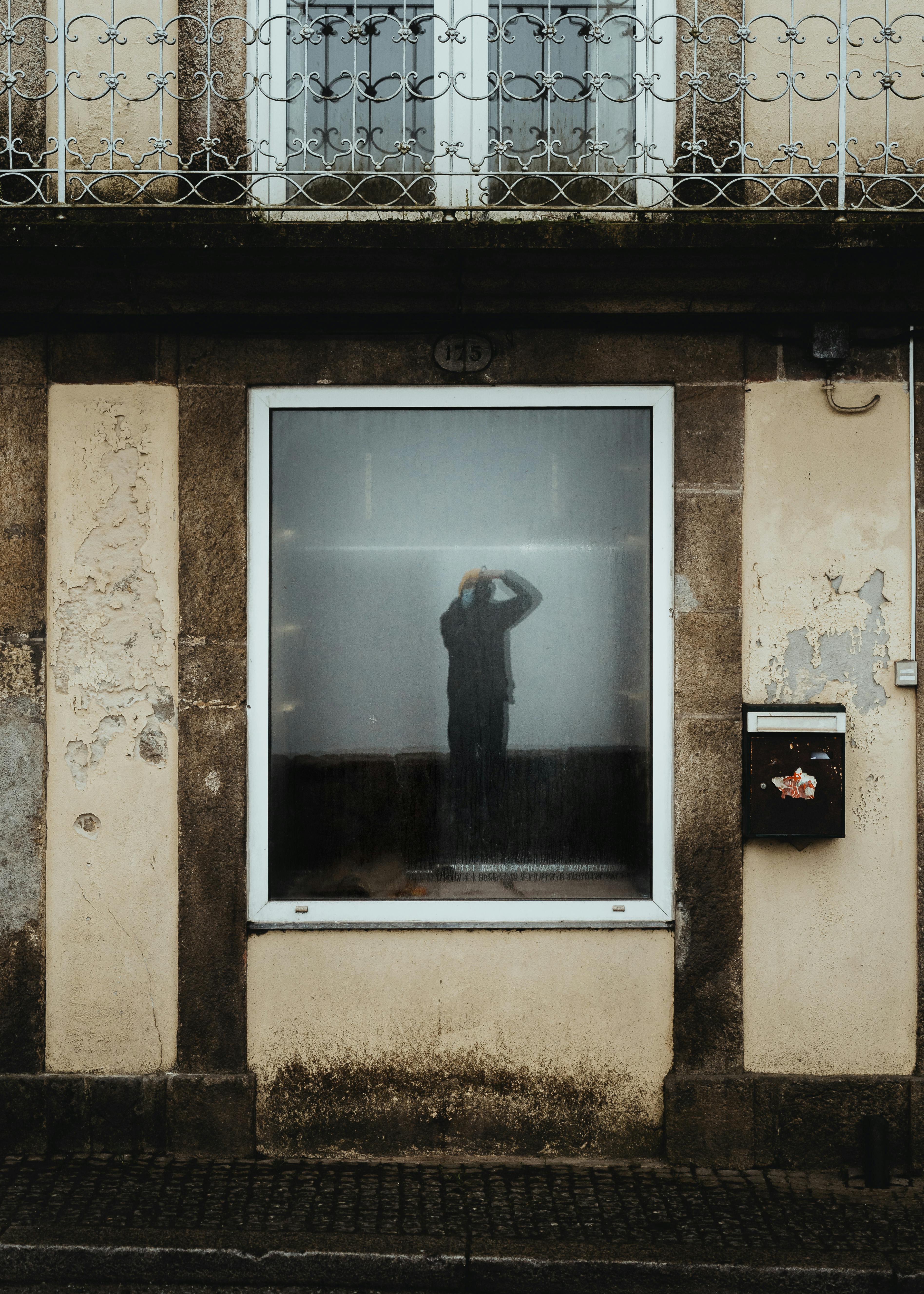 Reflection of a Person in a Mirror · Free Stock Photo