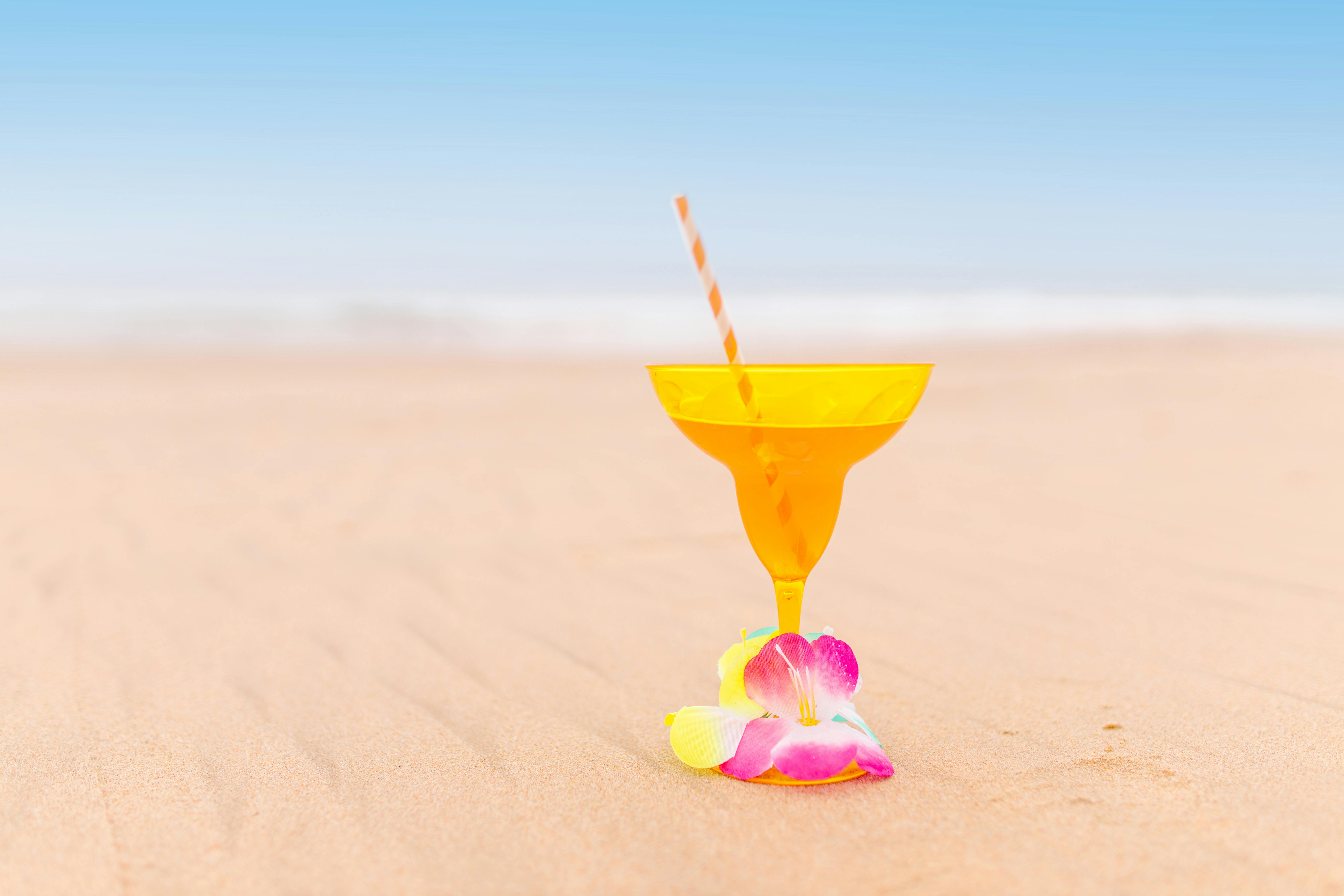 Yellow Cocktail Glass in Close Up Photography · Free Stock Photo