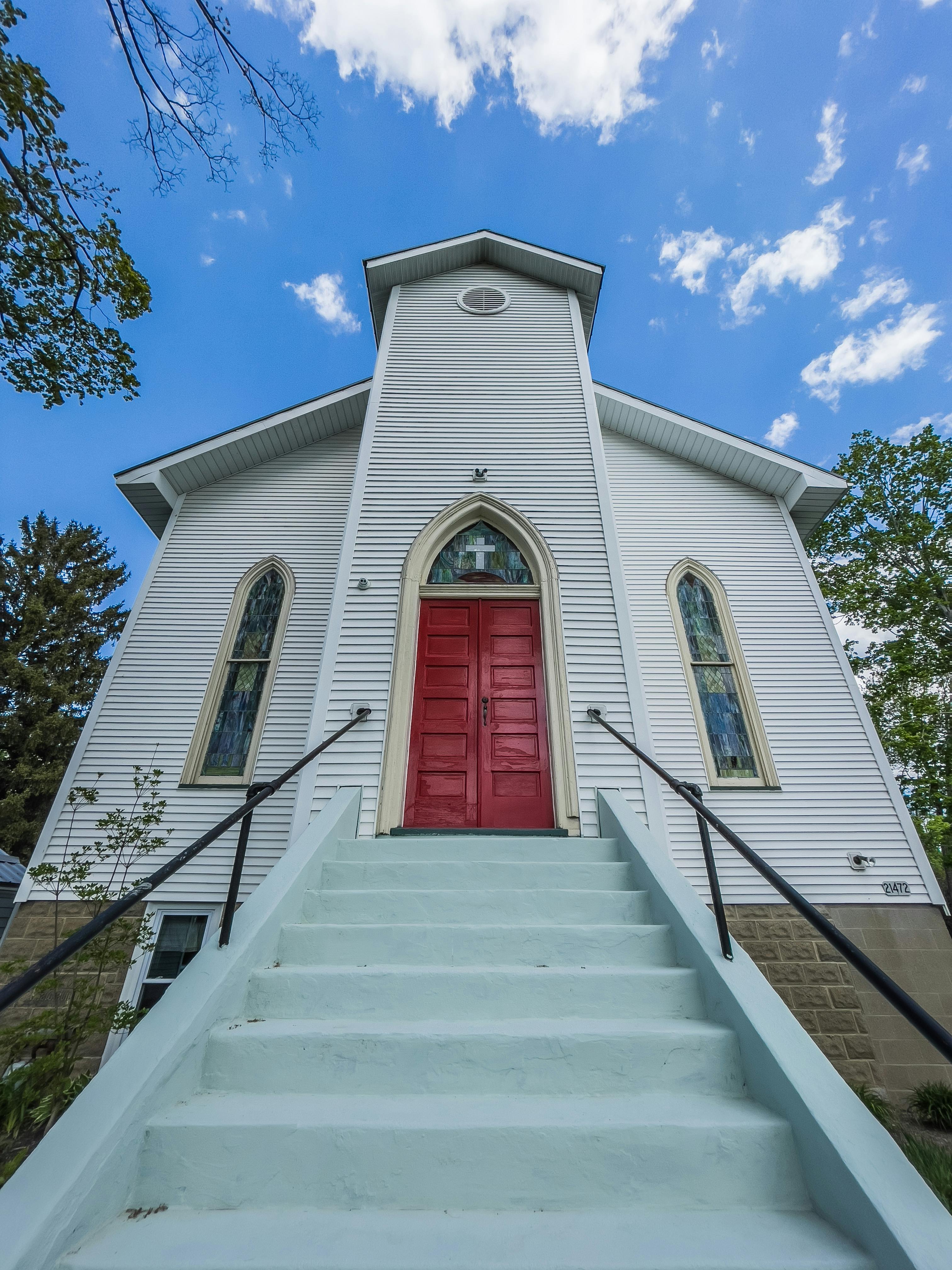 Low Angle Photo of White Church · Free Stock Photo