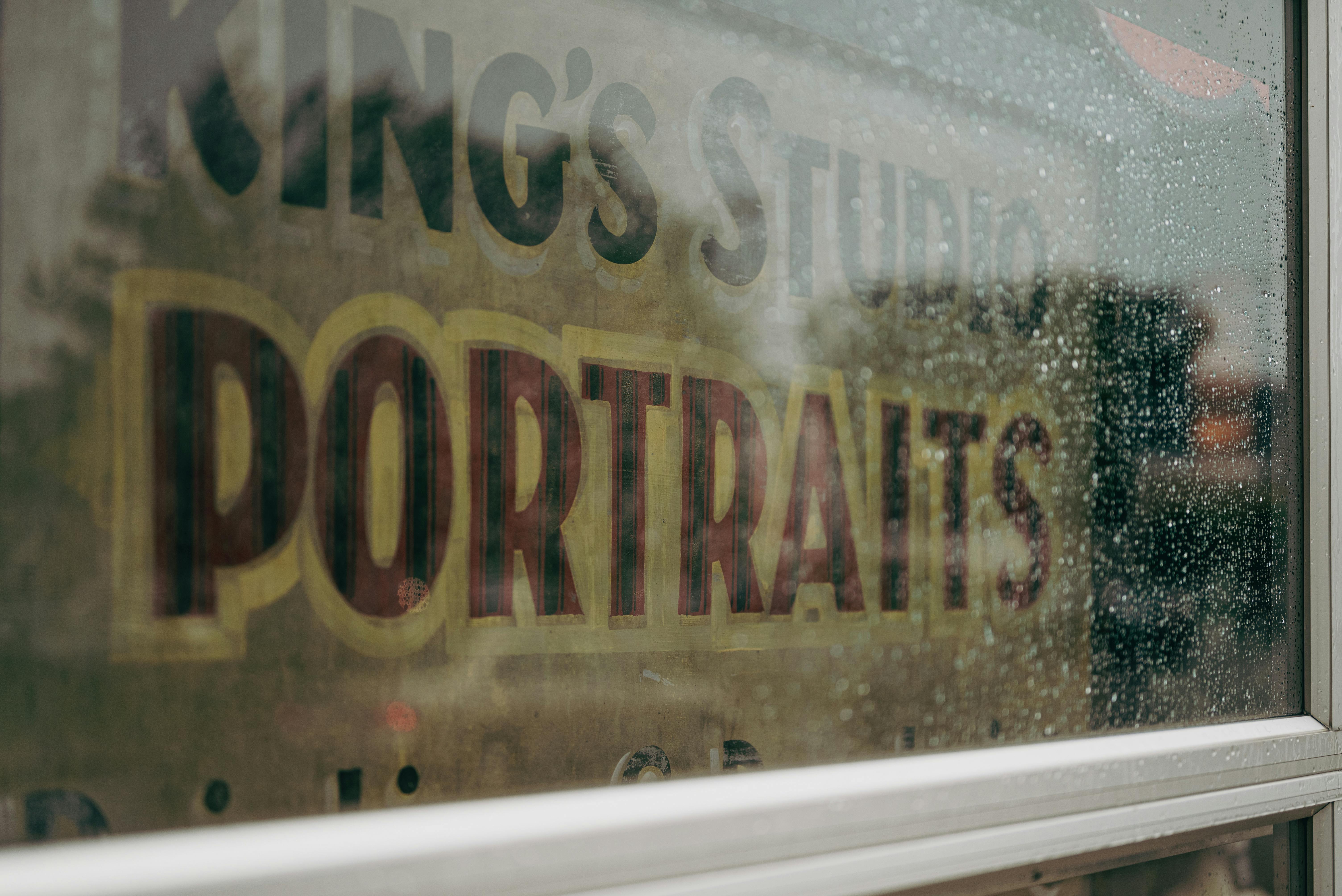 Sign Behind Window · Free Stock Photo