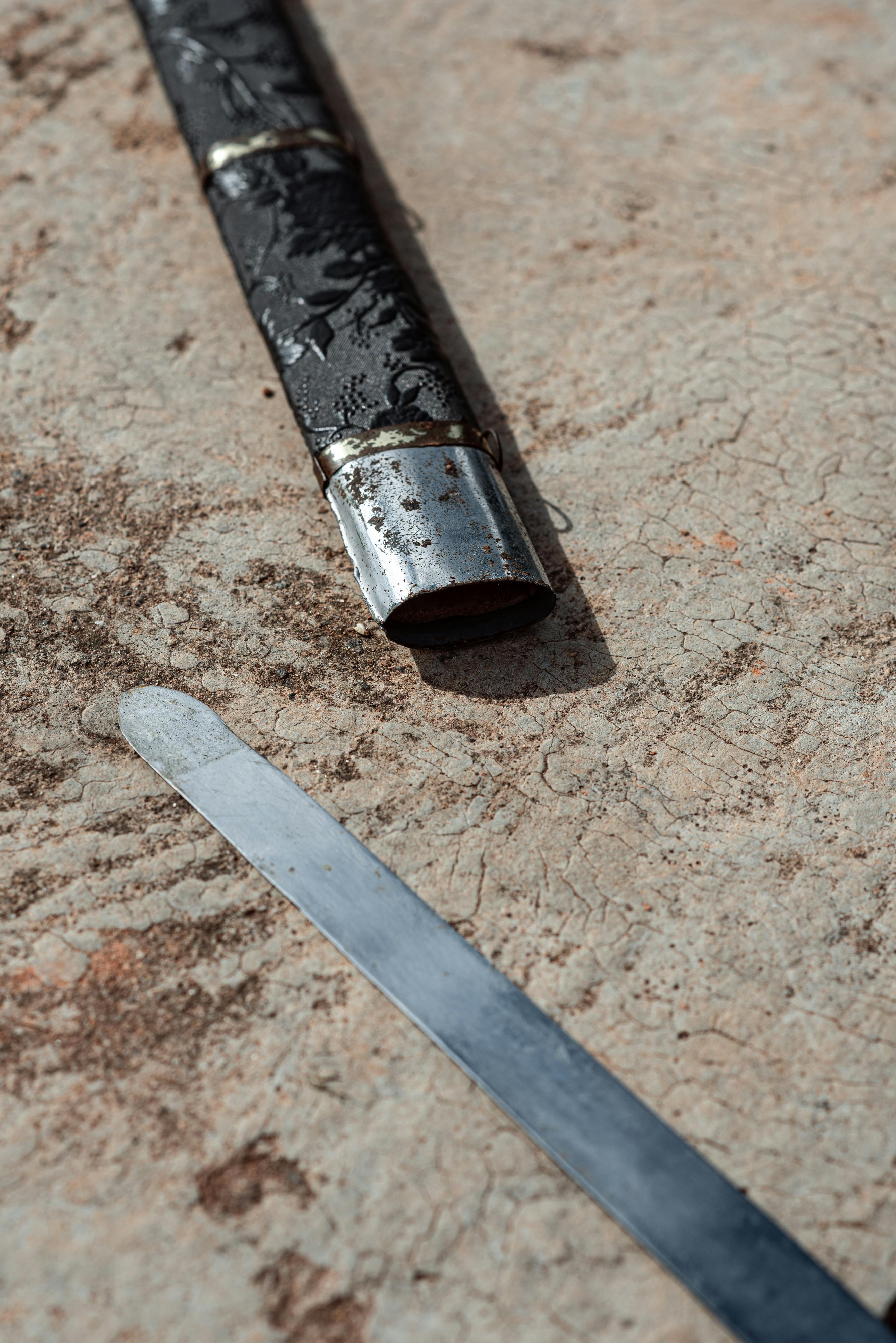Close-up of Sword on Ground · Free Stock Photo