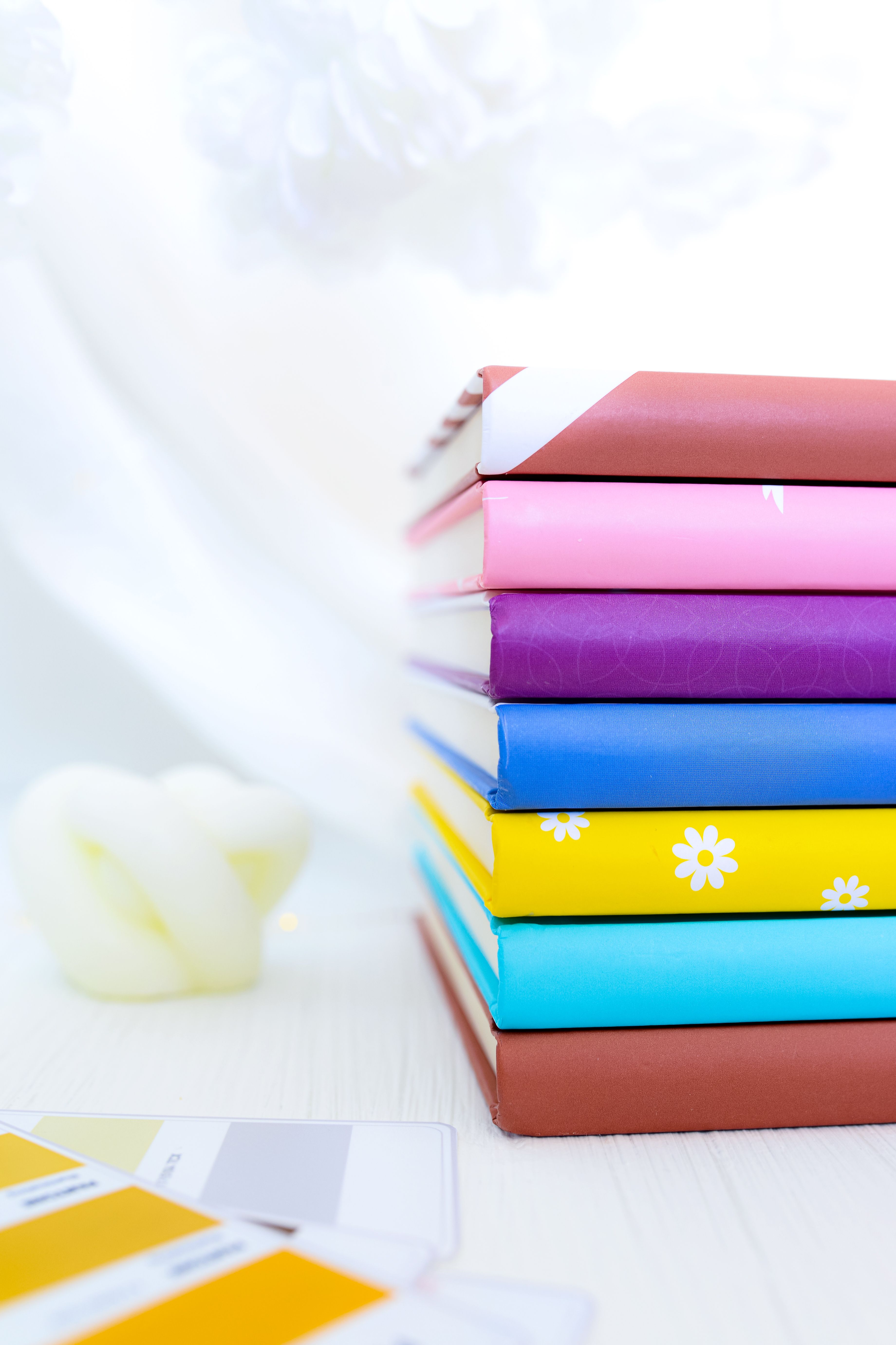 Stack of Colorful Notebooks · Free Stock Photo