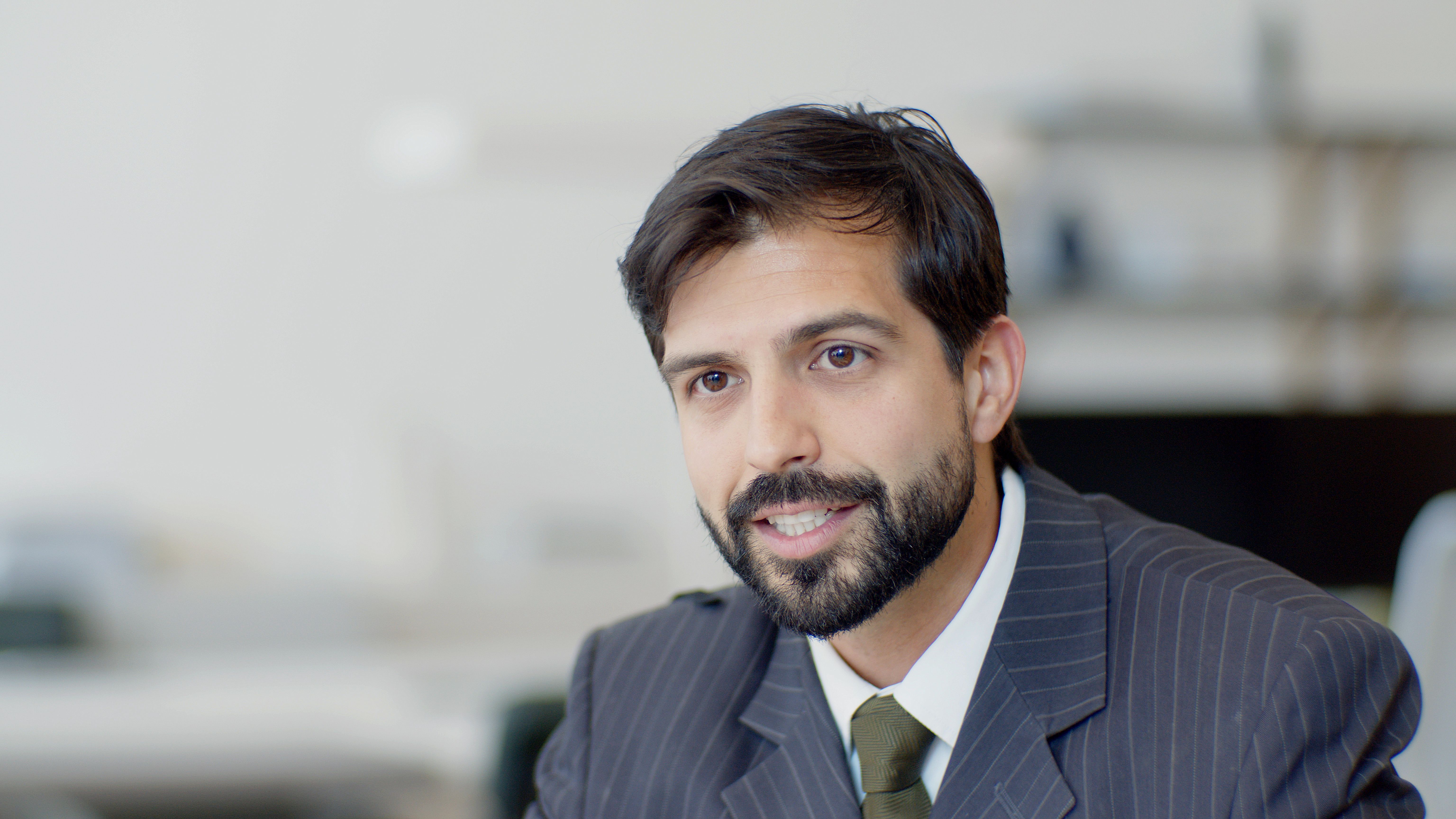 Man Wearing Corporate Attire at the Office · Free Stock Photo