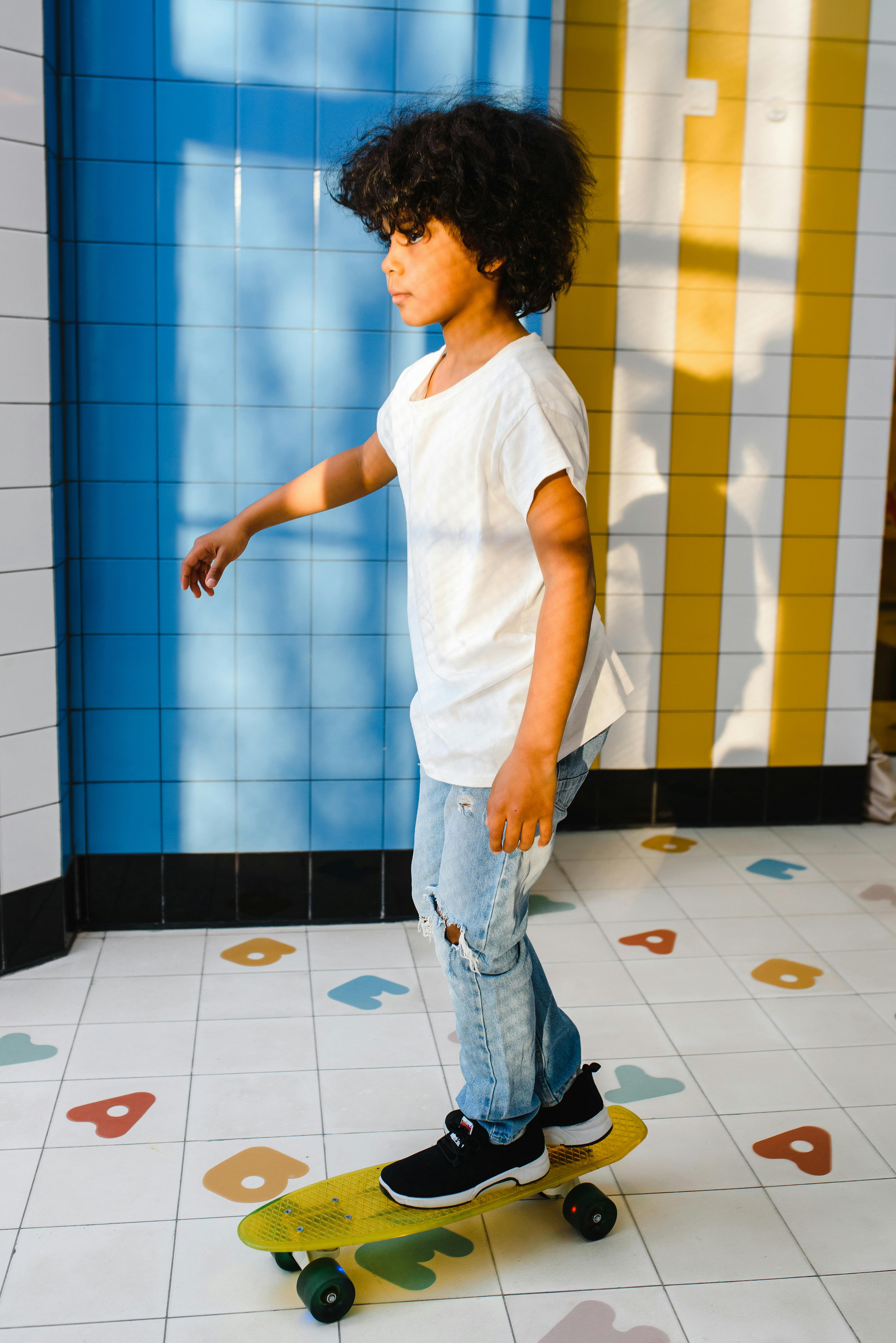 Girl Riding a Penny Board · Free Stock Photo