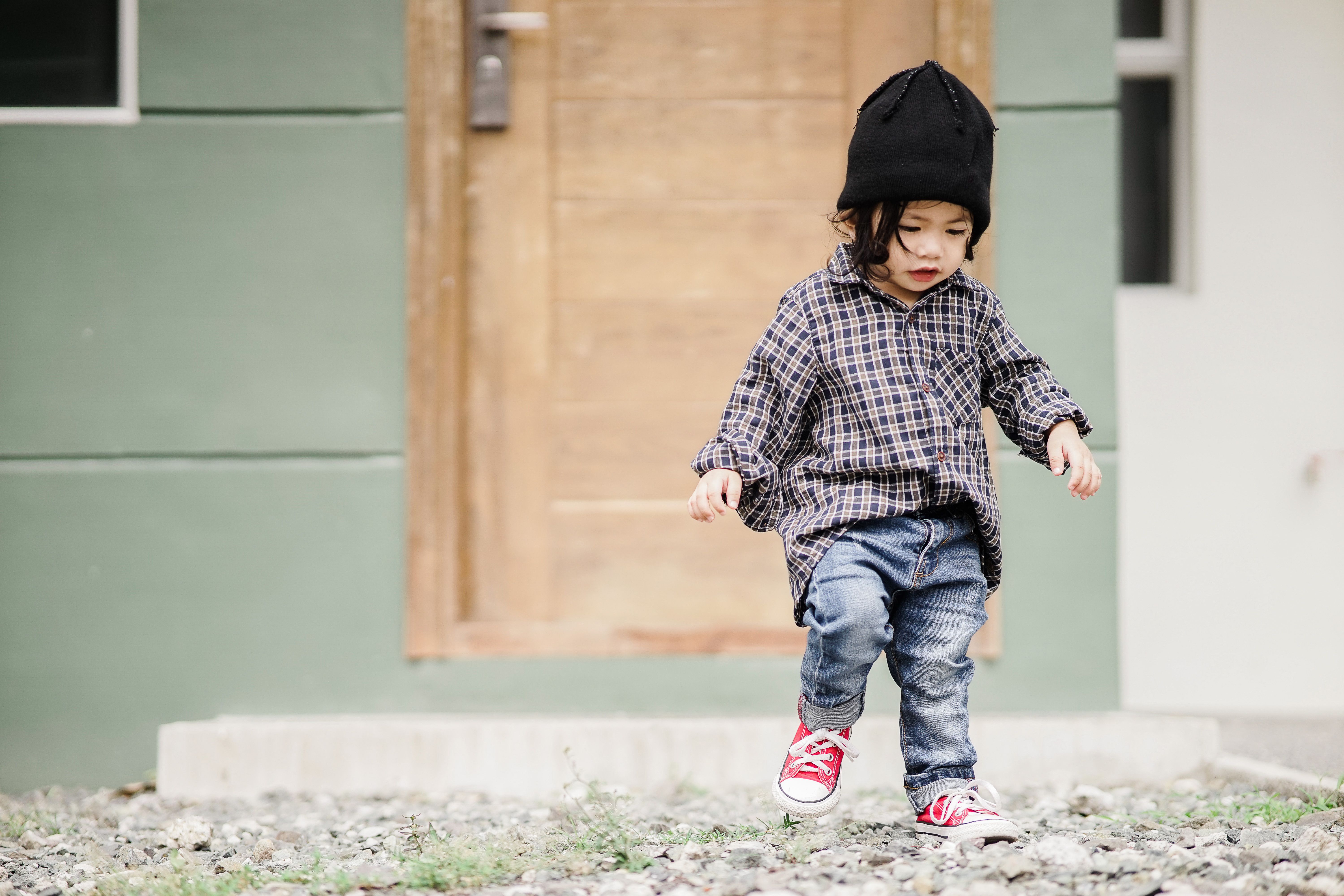 Boy Holding Map on Road · Free Stock Photo