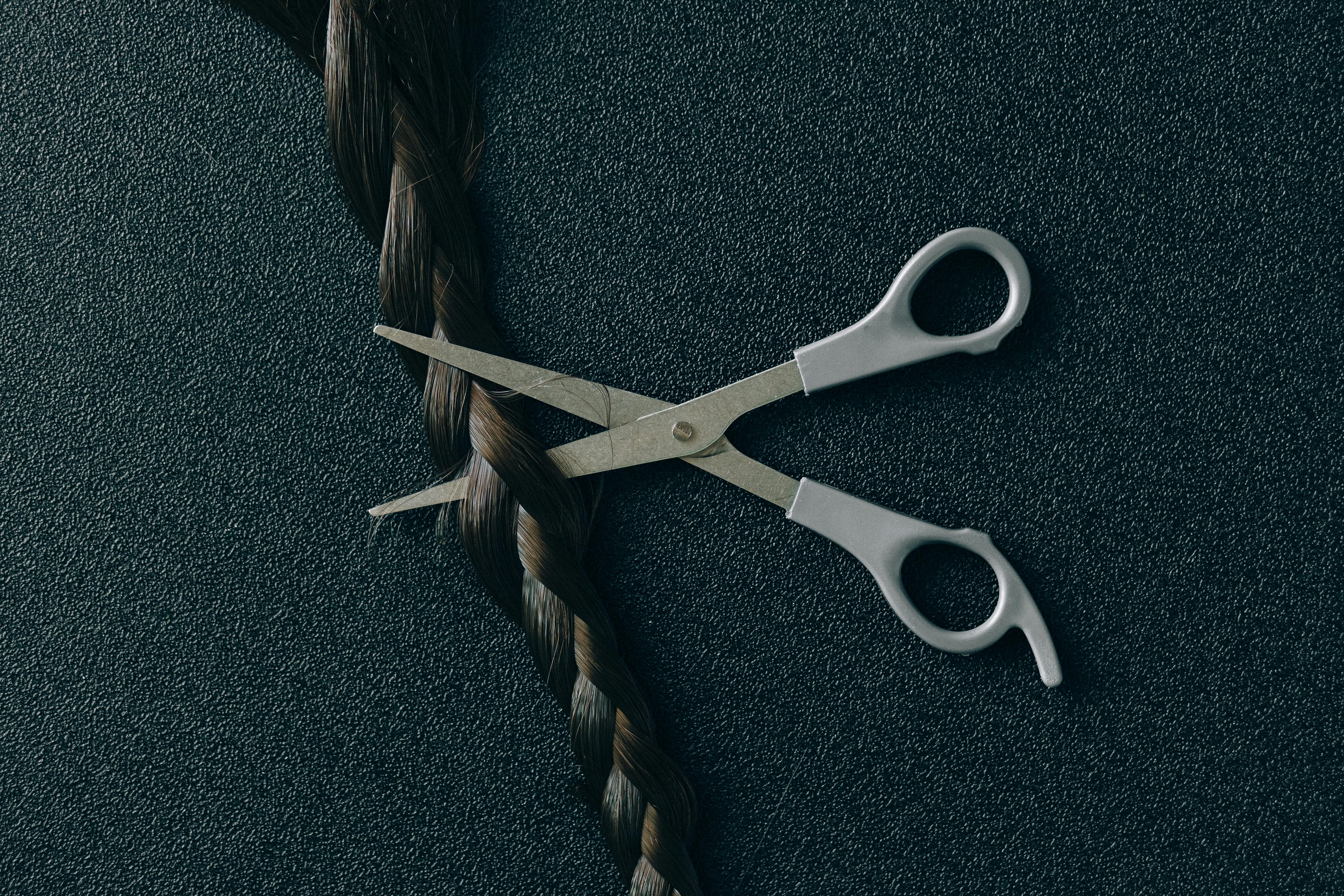 Photo of Scissors and Braided Hair · Free Stock Photo