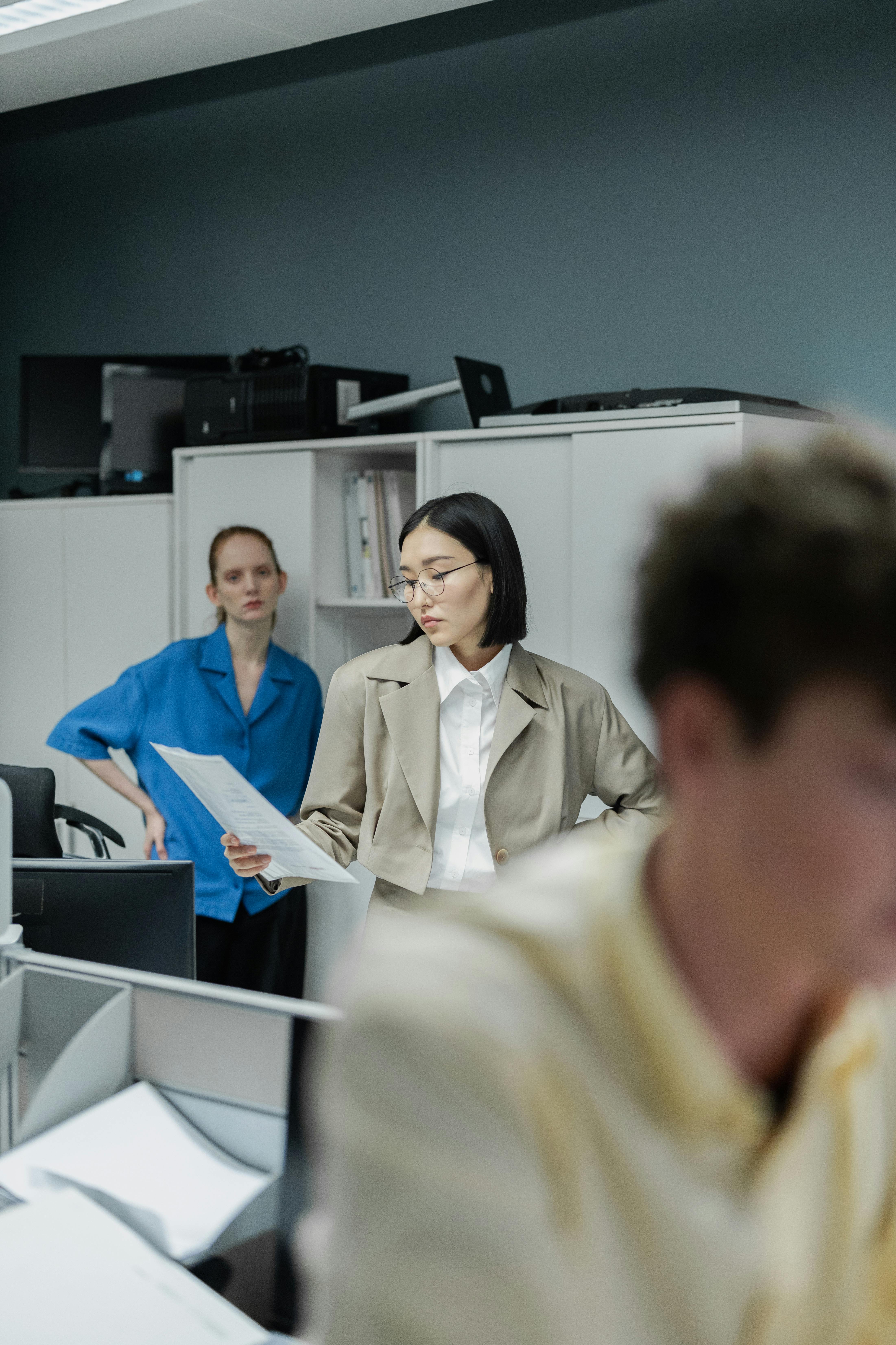 Short Hair Woman Reading a Paper · Free Stock Photo