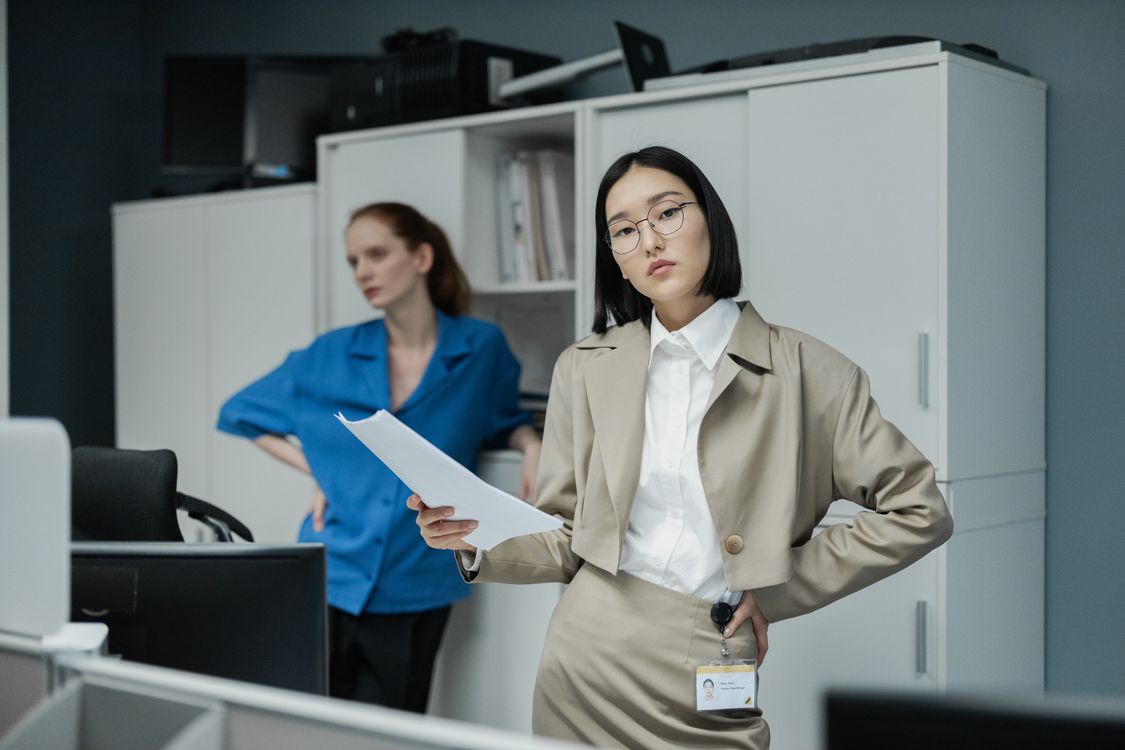 Women Standing In Office Free Stock Photo women-standing-in-office-free-stock-photo