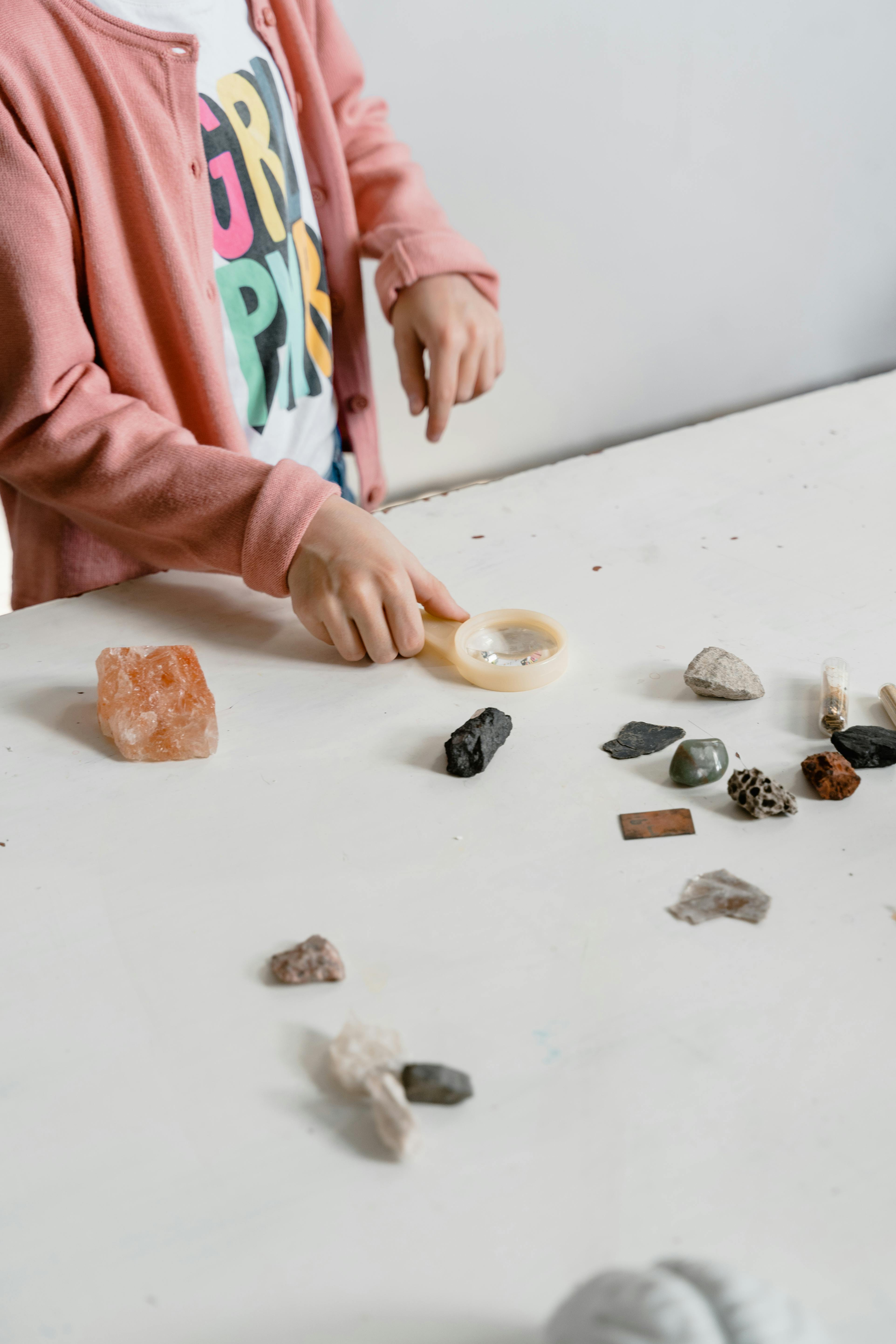 Girl Playing with Rocks · Free Stock Photo