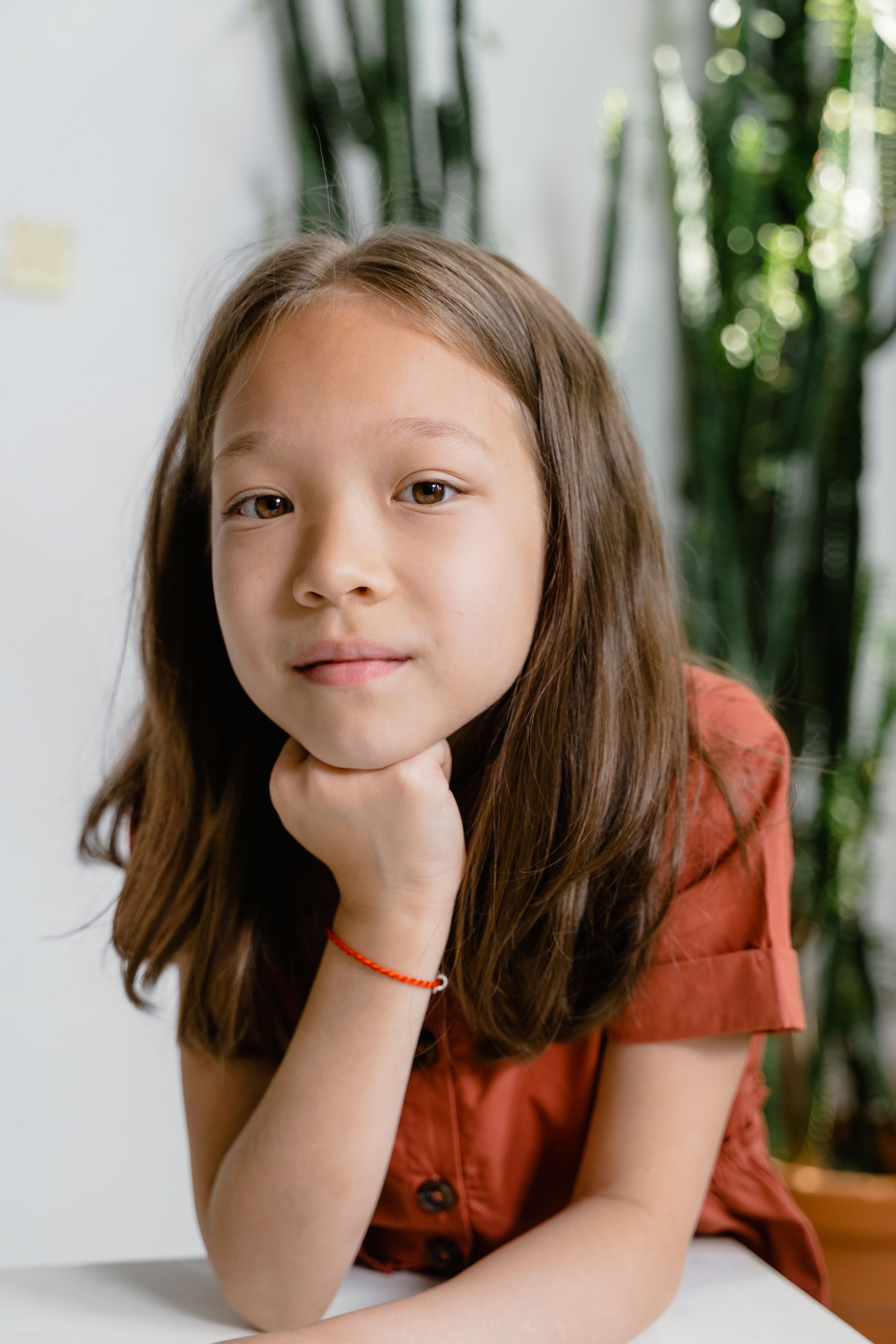 A Girl Posing at the Camera · Free Stock Photo