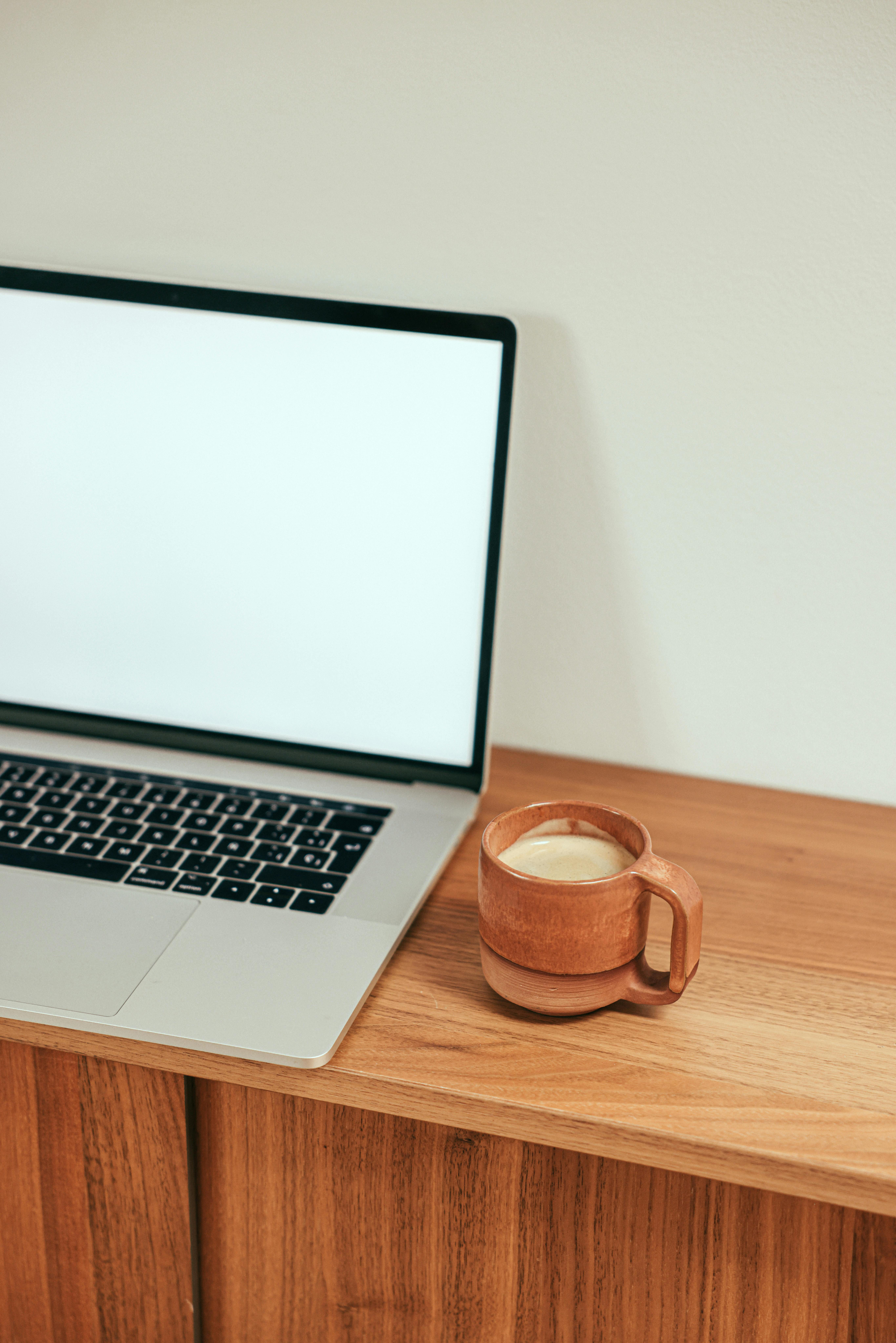 A Cup of Coffee near the Laptop · Free Stock Photo