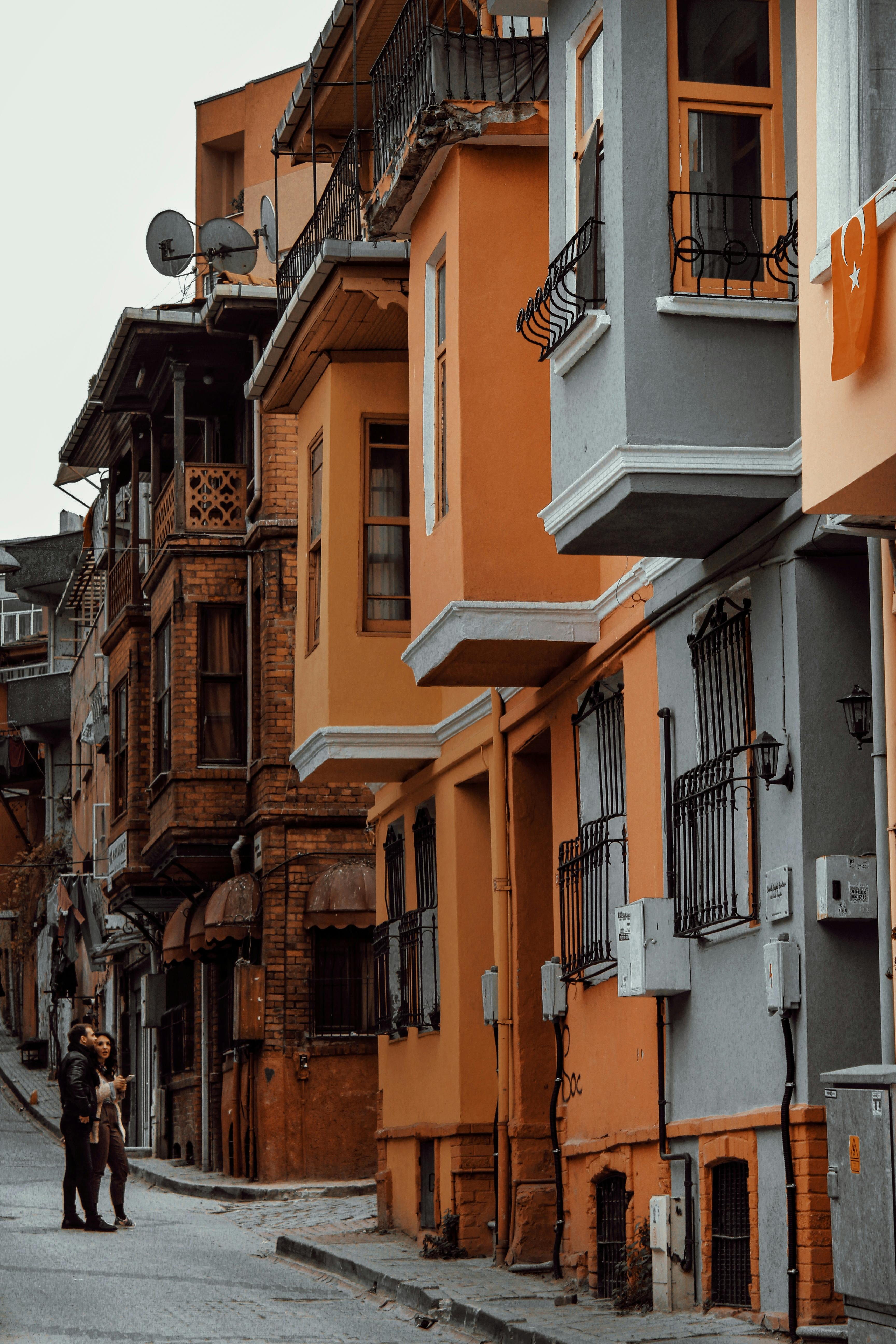 Asphalt Road Between Houses · Free Stock Photo