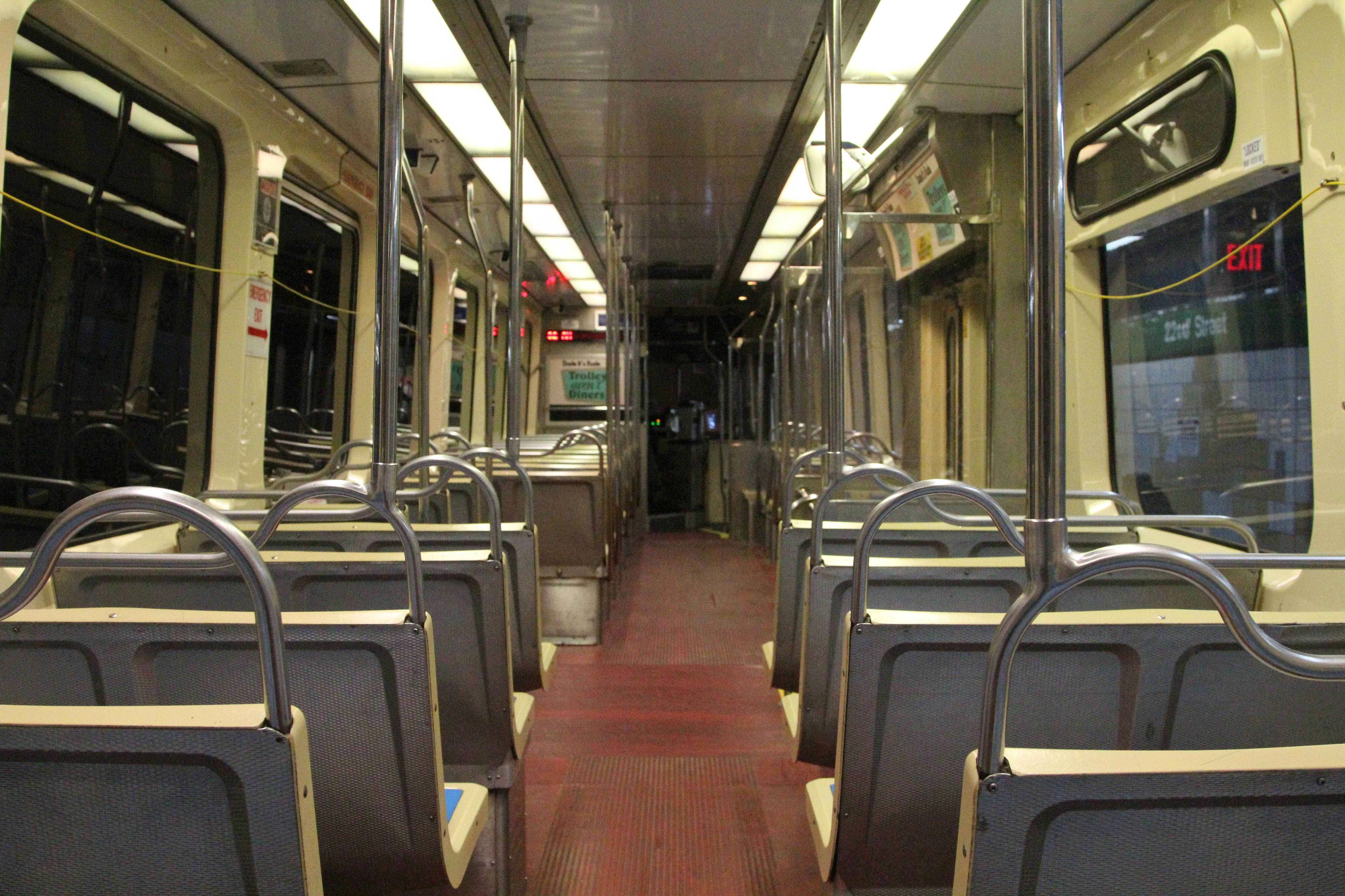 Grayscale Photography of Train Car Interior · Free Stock Photo