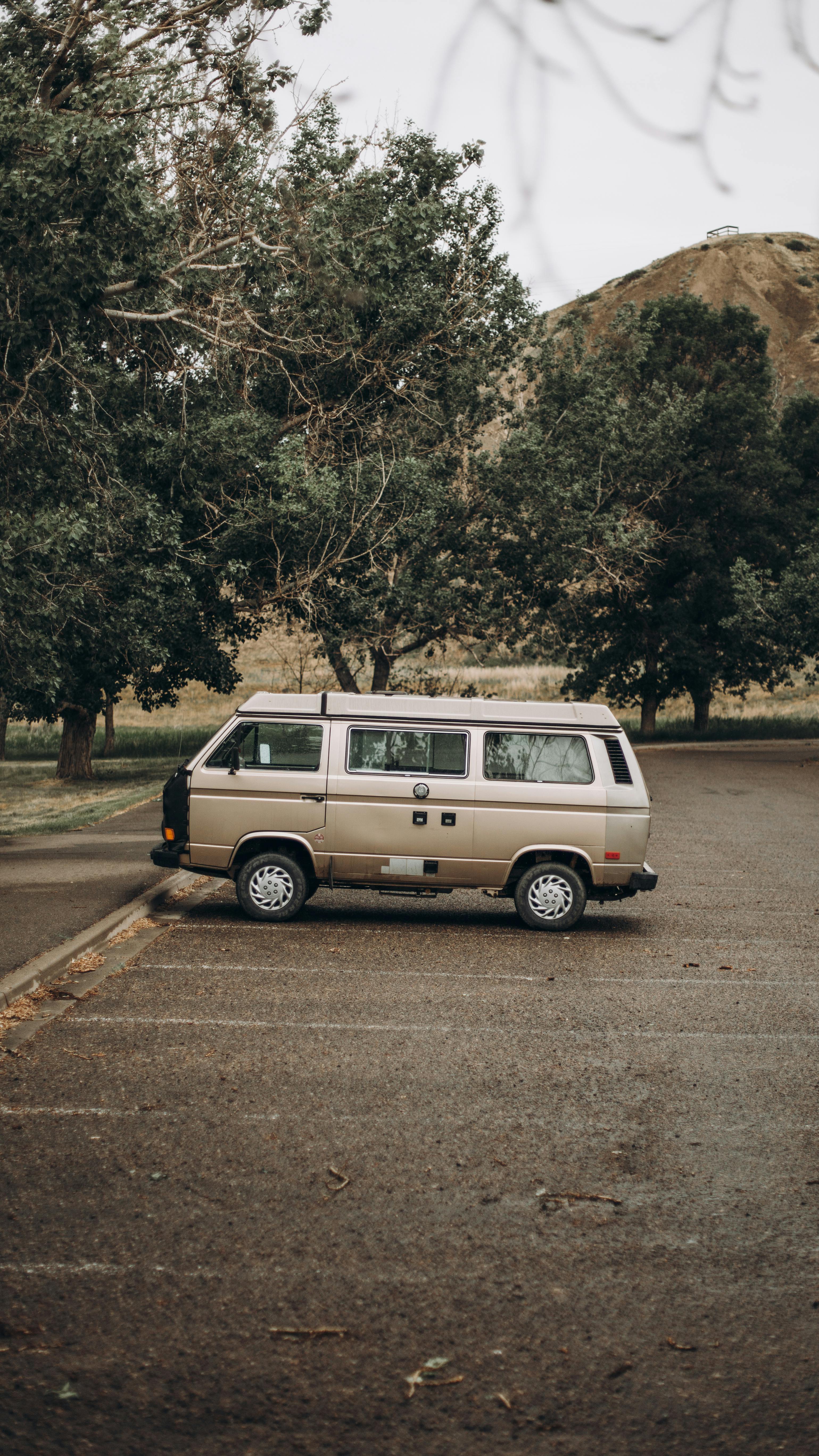 Brown Van Parked on the Parking Area · Free Stock Photo