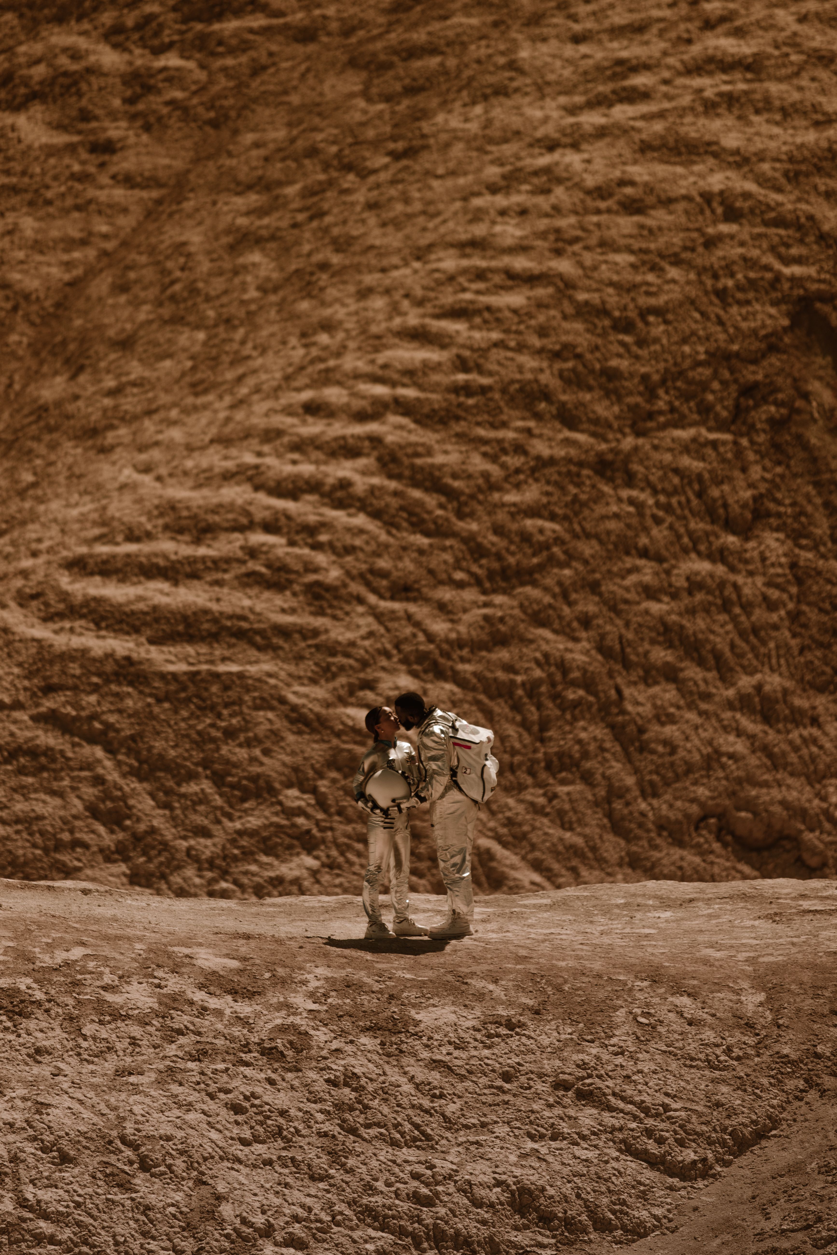 Astronauts in Spacesuits Kissing Each Other on a Mars Surface · Free ...