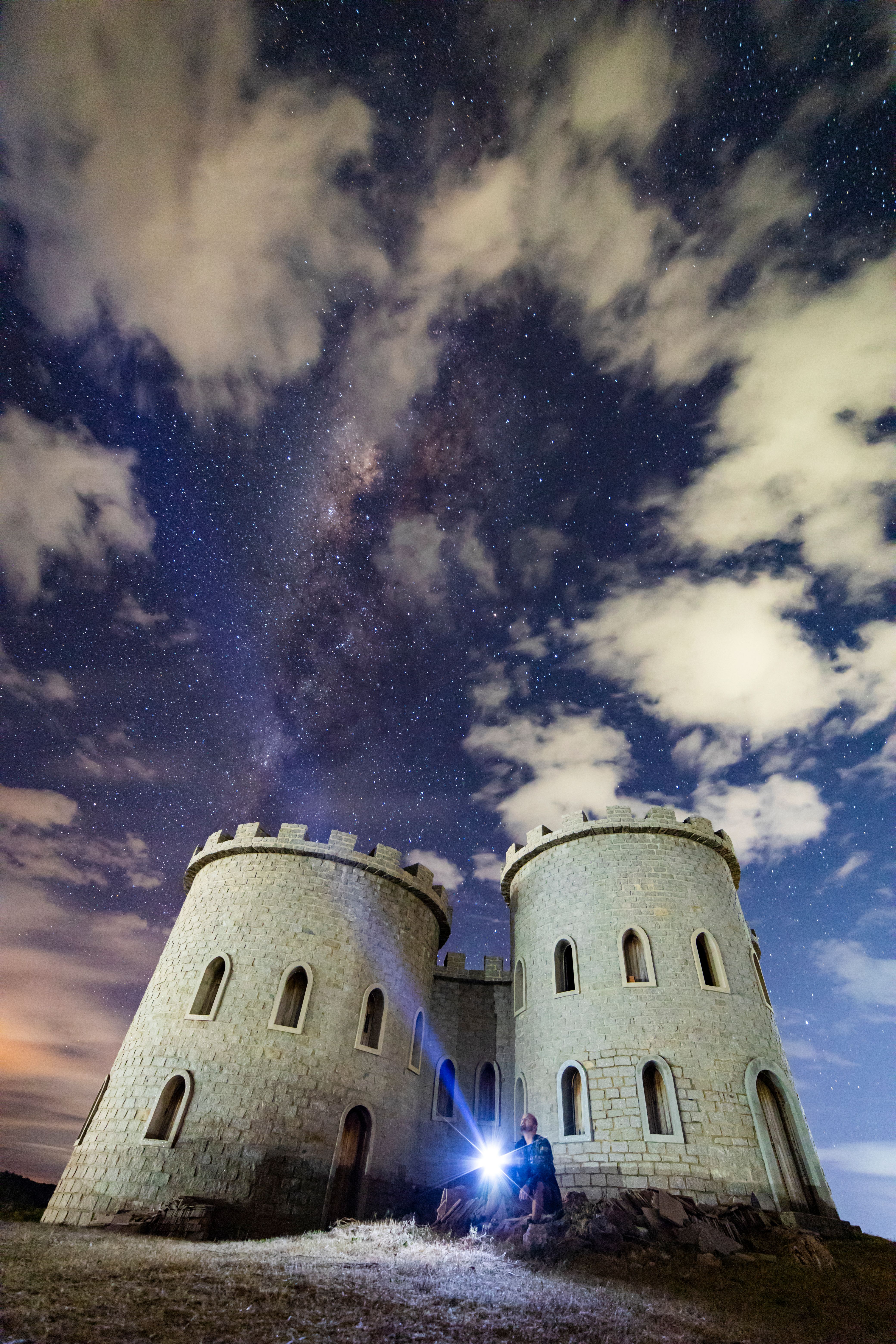 Brick Building against Starry Night Sky · Free Stock Photo