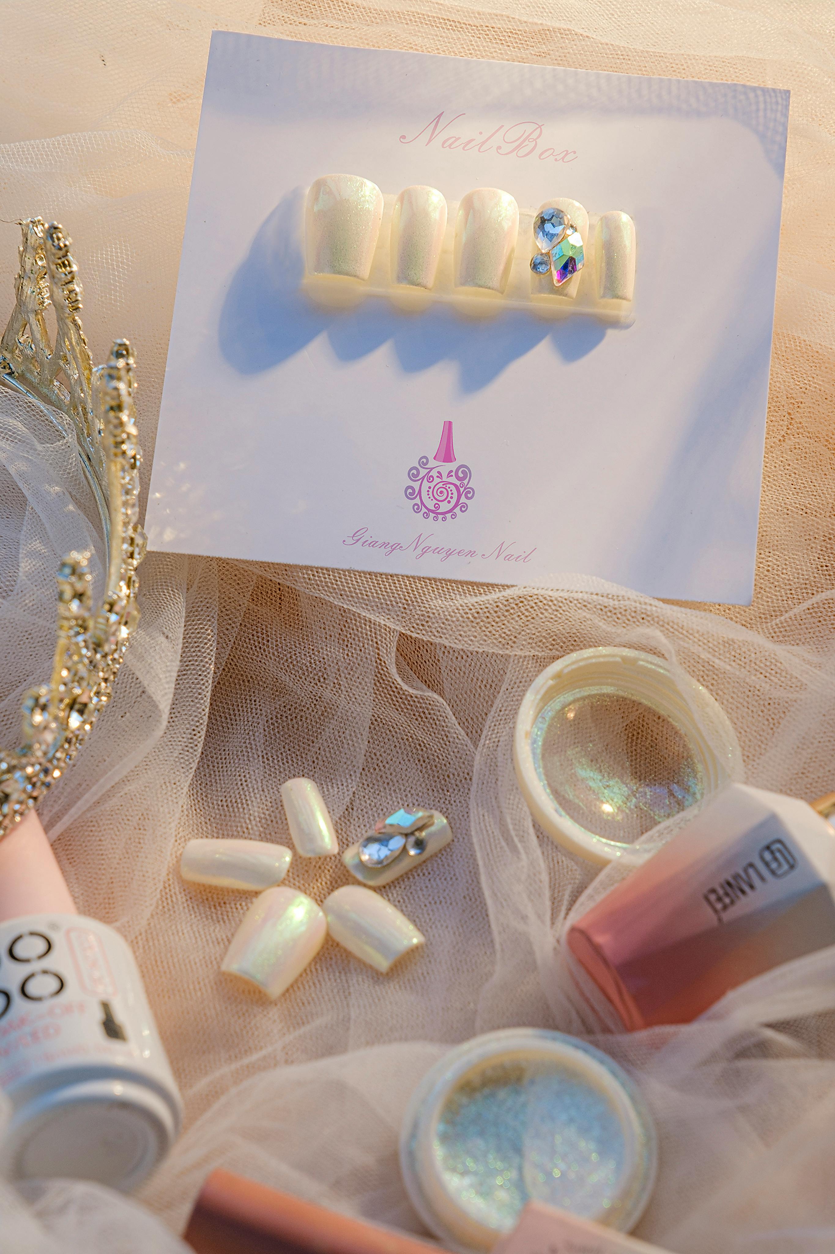 Nail Products on Fabric Background · Free Stock Photo