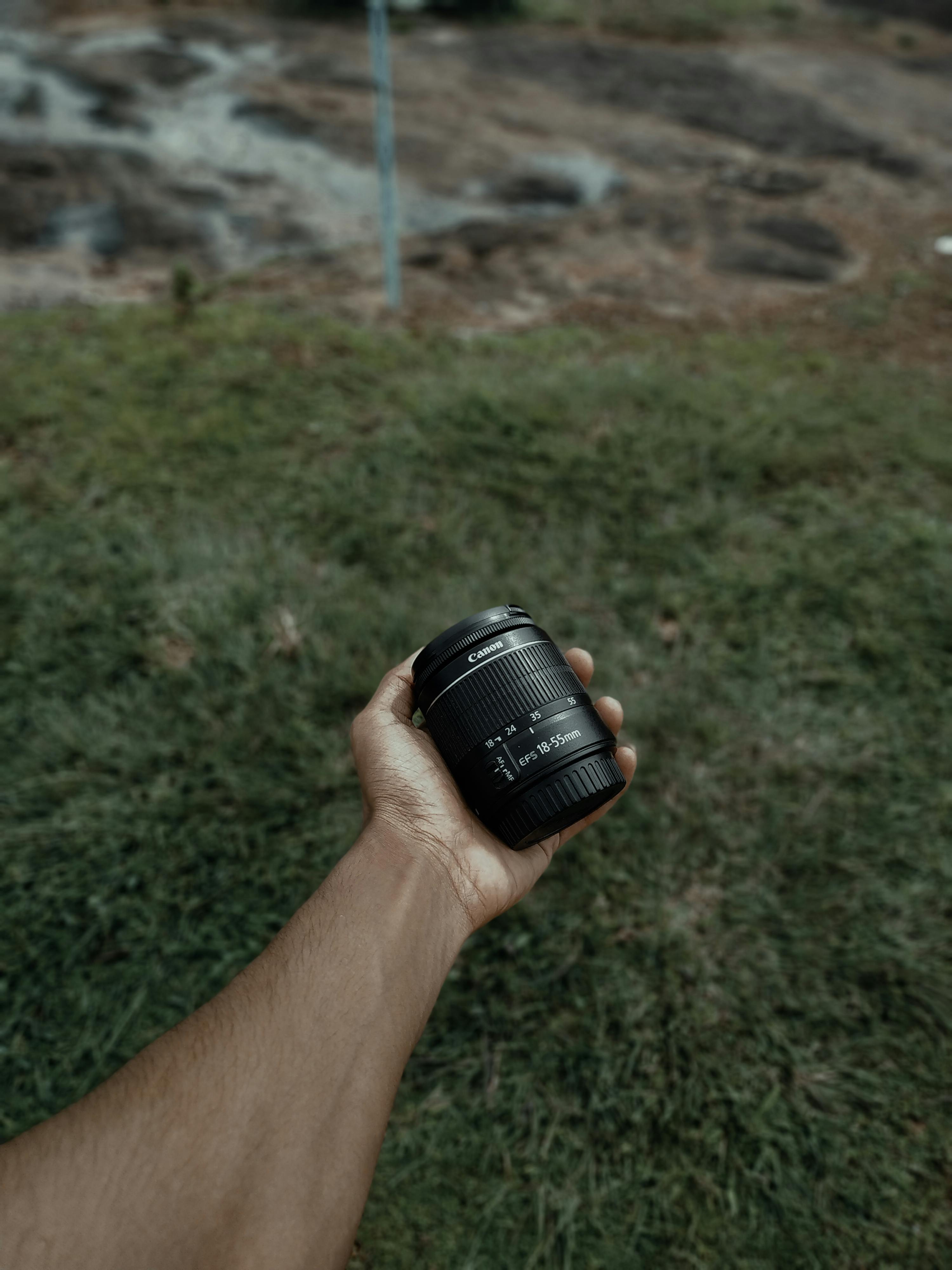 Hand Holding Camera Lens · Free Stock Photo