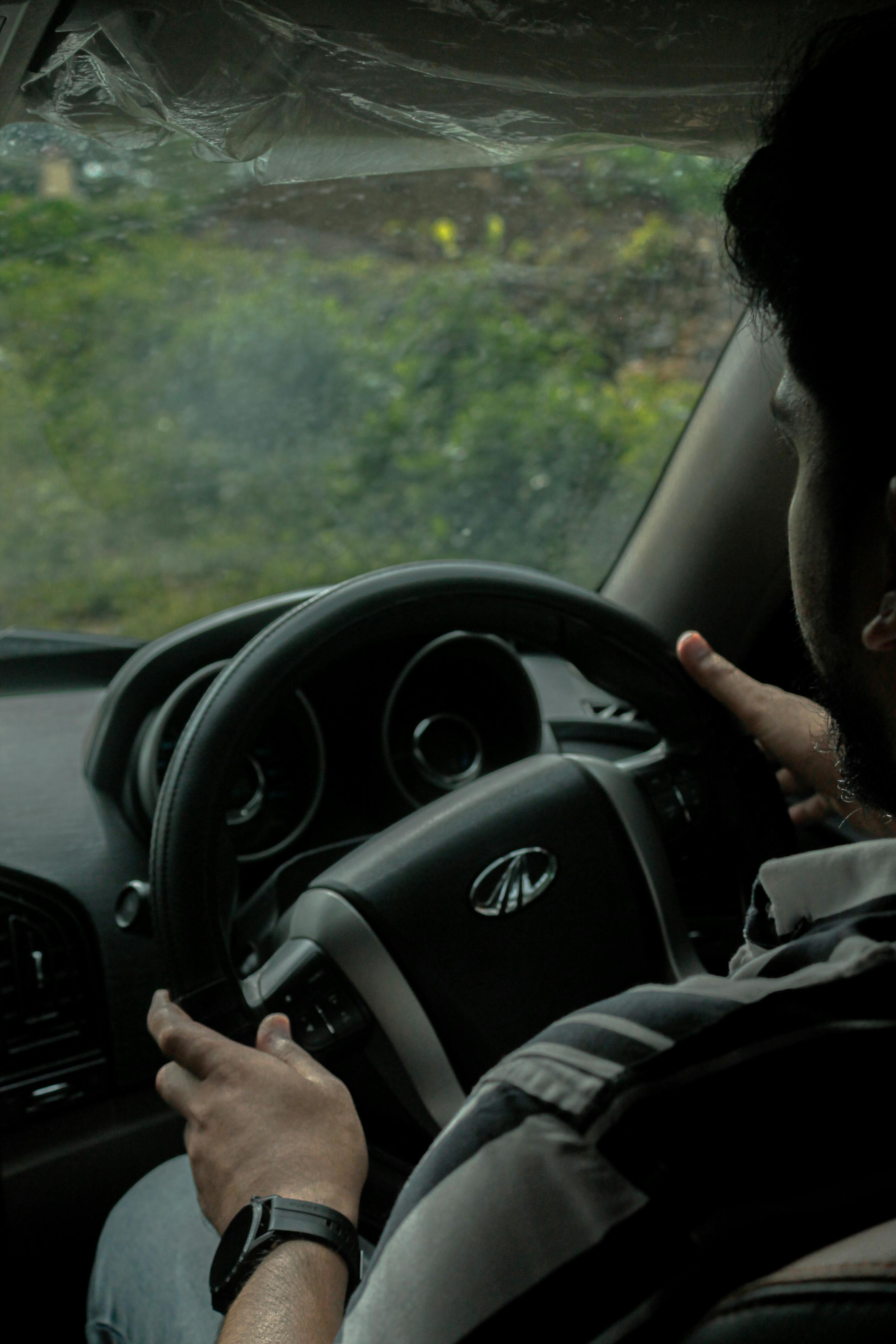 Person Driving a Car · Free Stock Photo