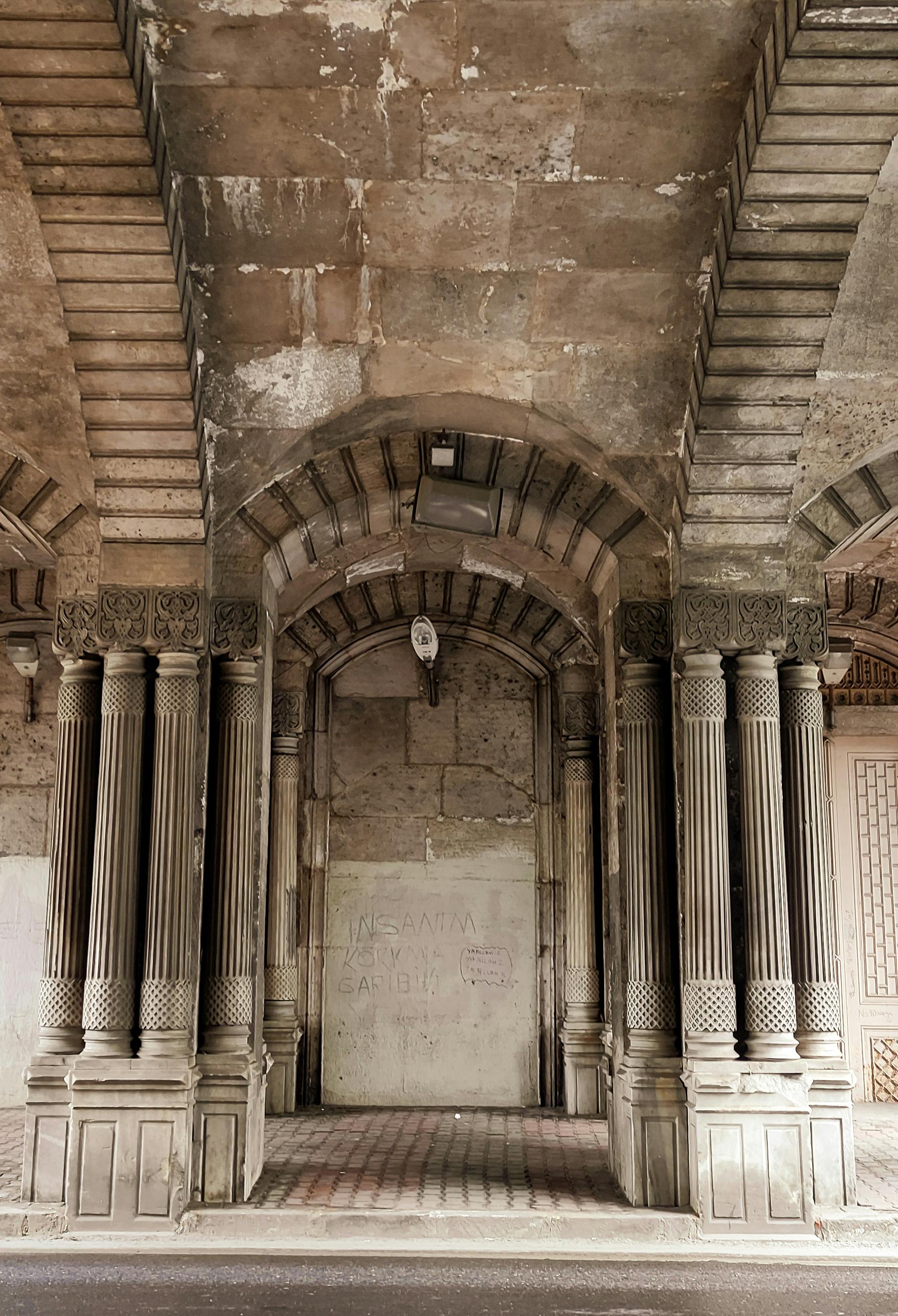Gray Concrete Columns Under Gray Ceiling · Free Stock Photo