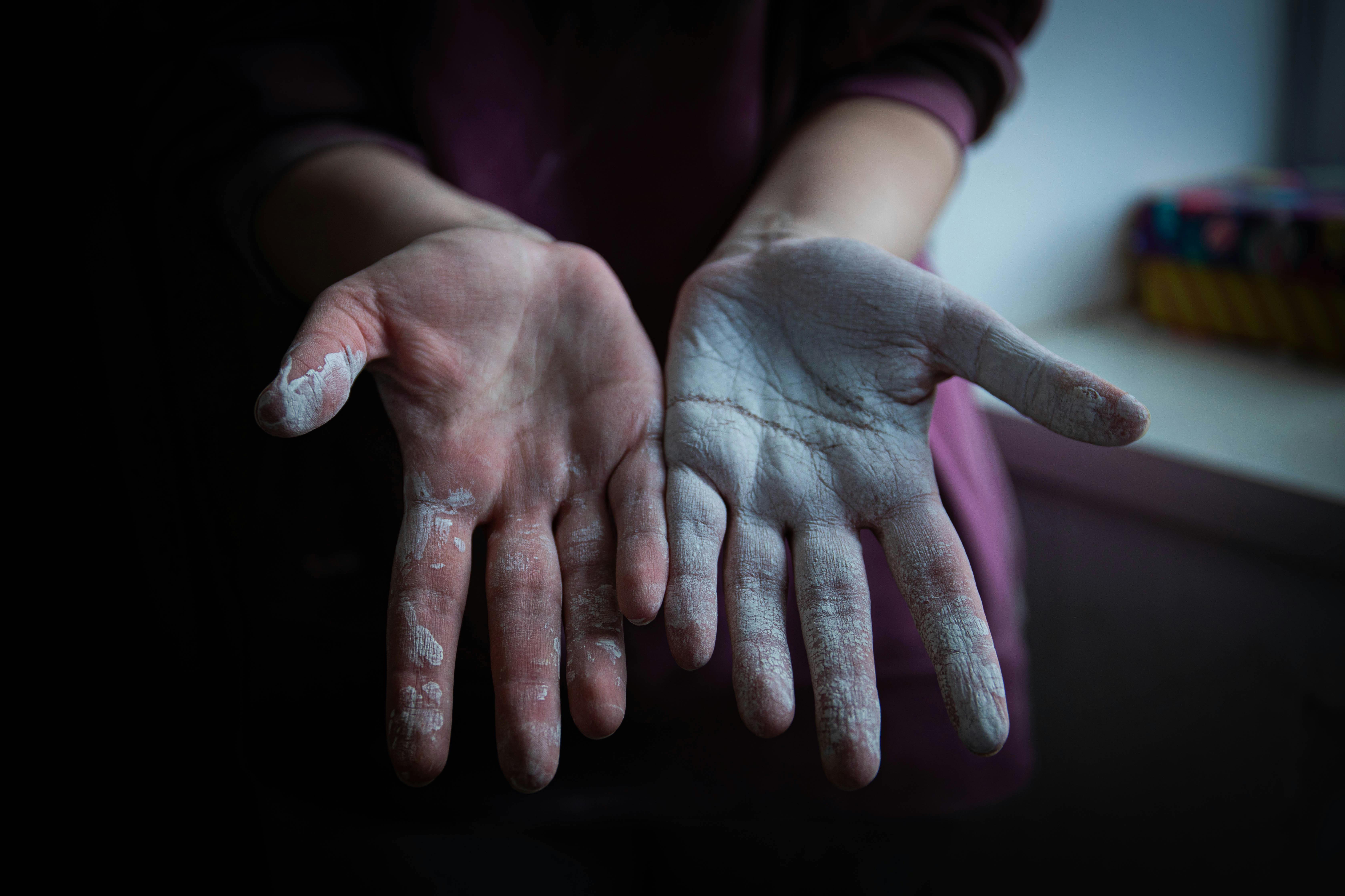 Person Holding Brown Sandpaper · Free Stock Photo