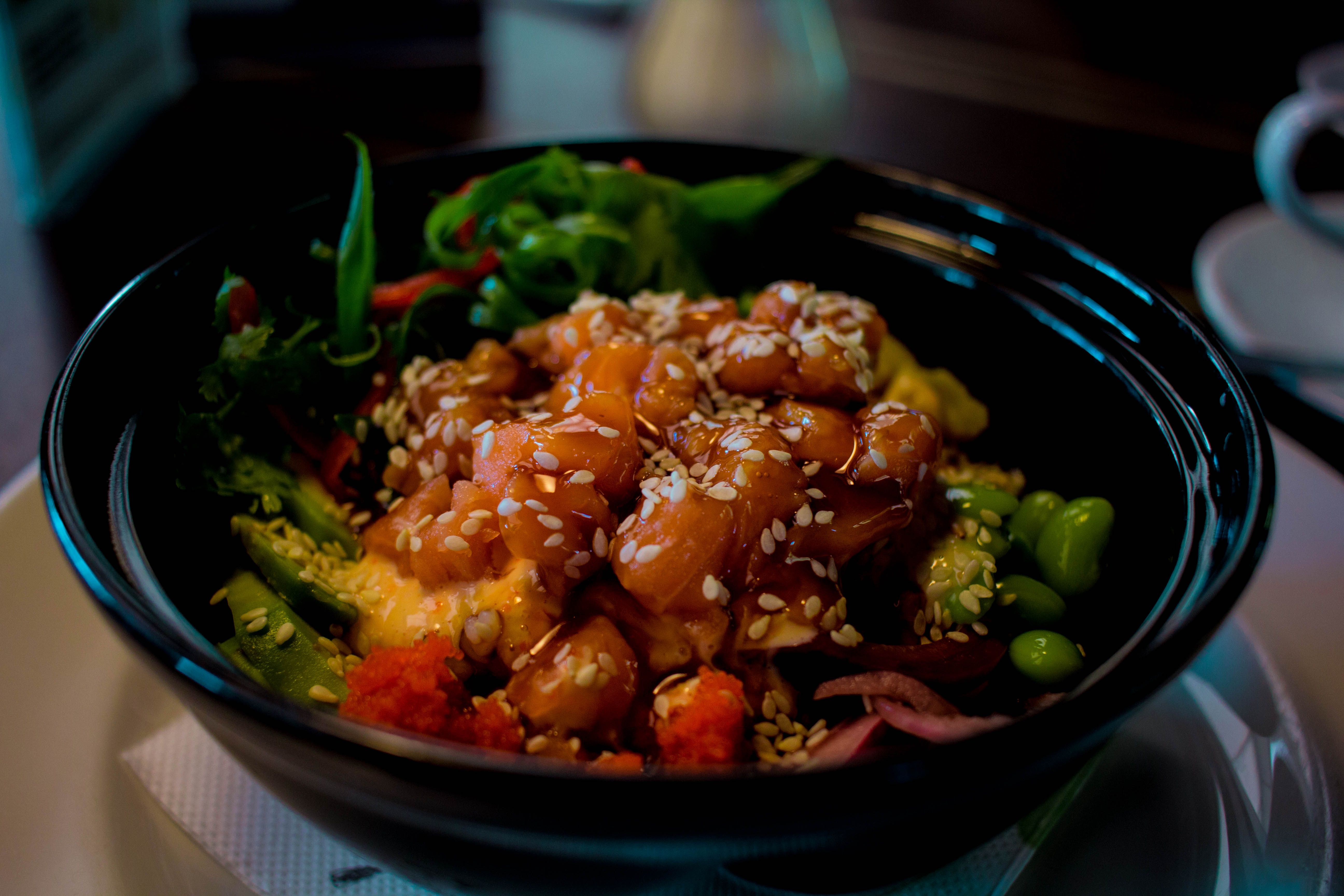 Close Up Photo of Cooked Food on Black Ceramic Bowl · Free Stock Photo