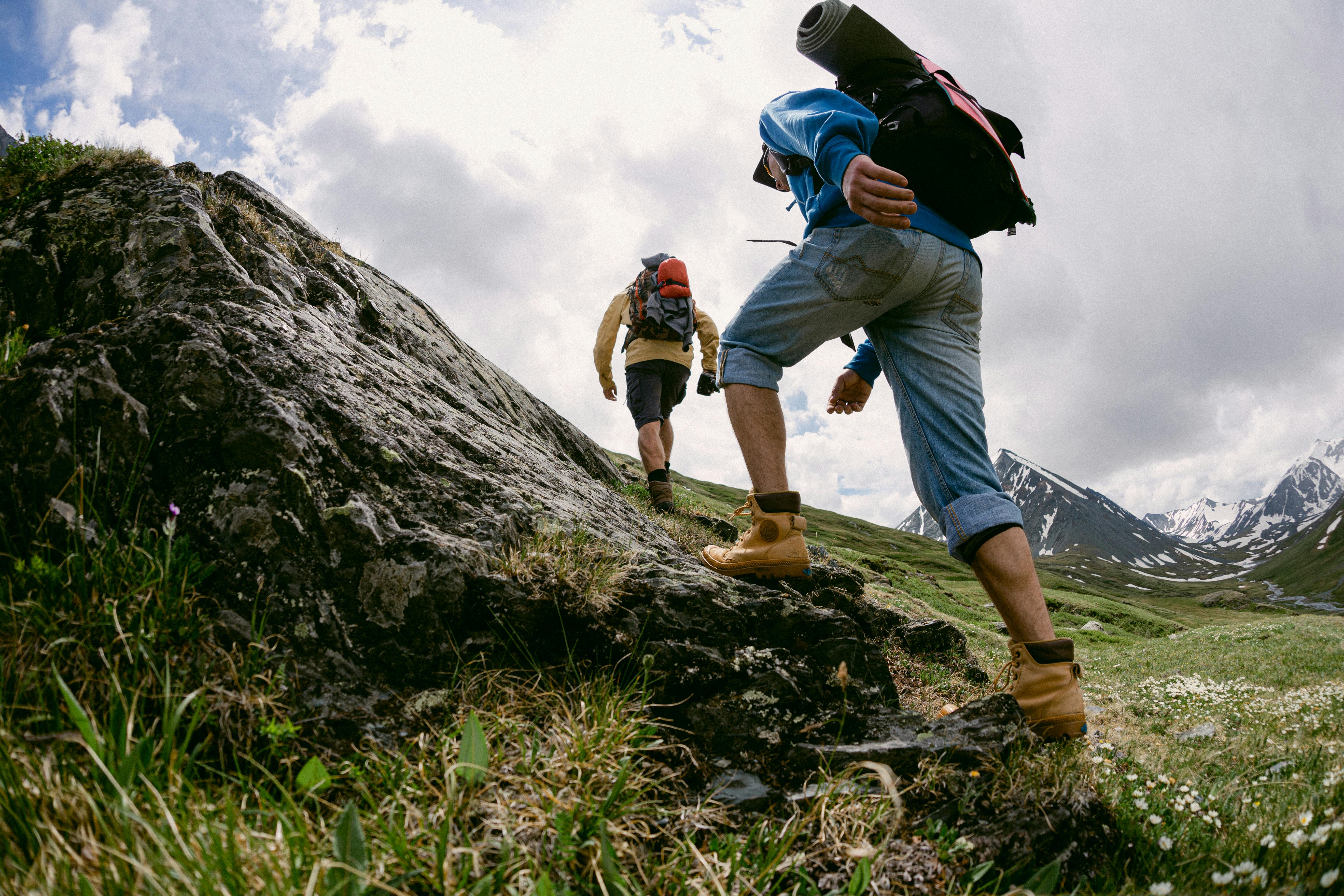 Hikers Walking Uphill · Free Stock Photo